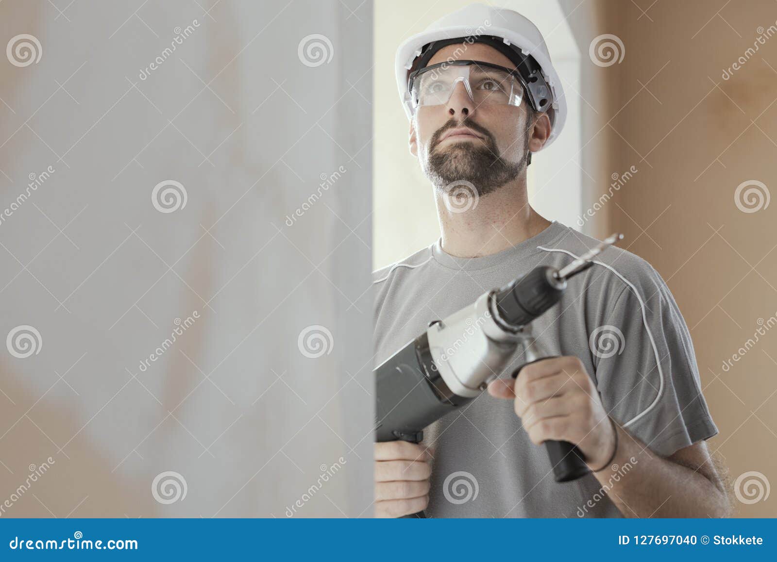Professional Construction Worker Using a Drill Stock Photo - Image of ...