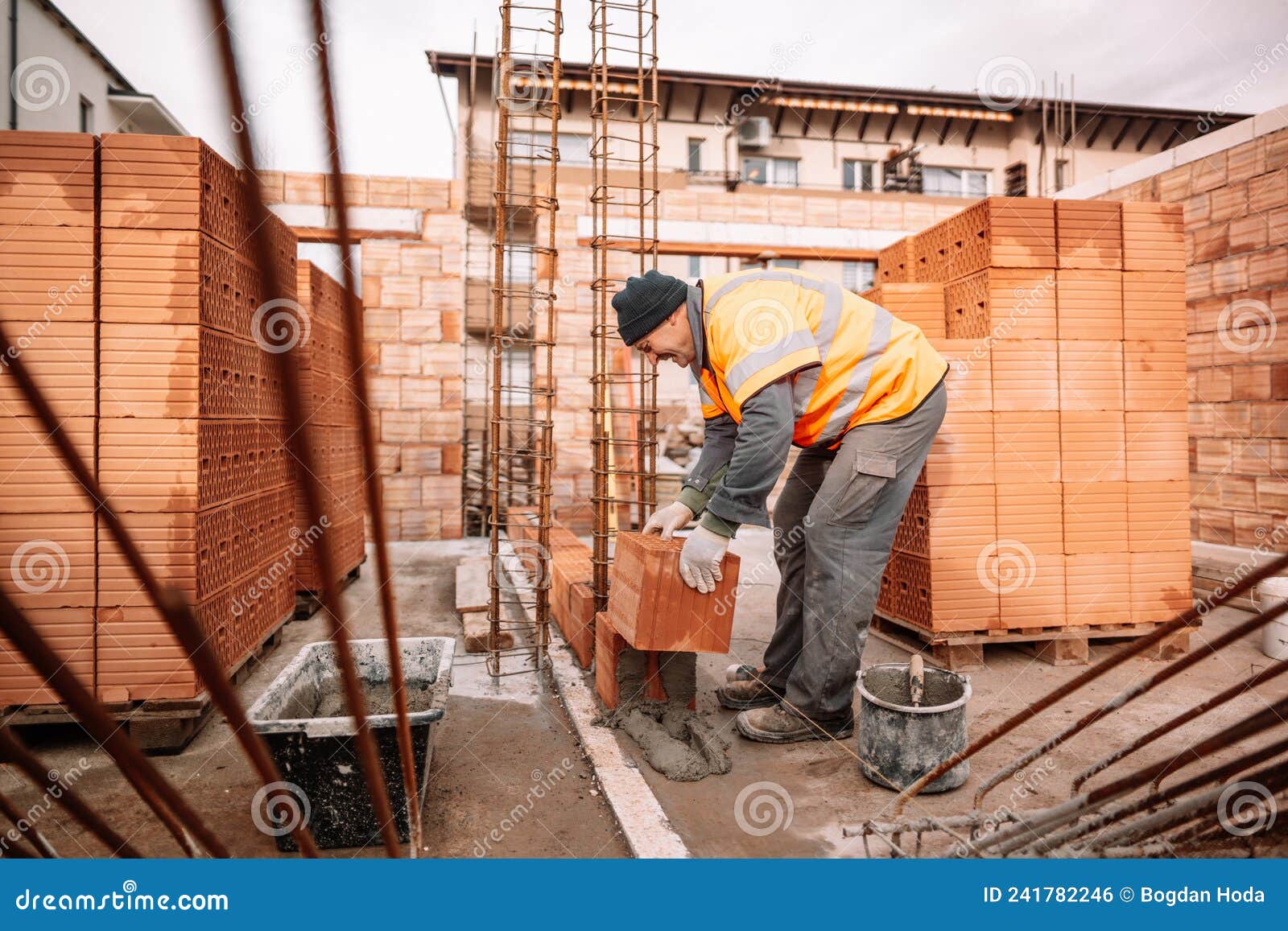 Professional Construction Worker Using Pan Knife for Building Brick ...