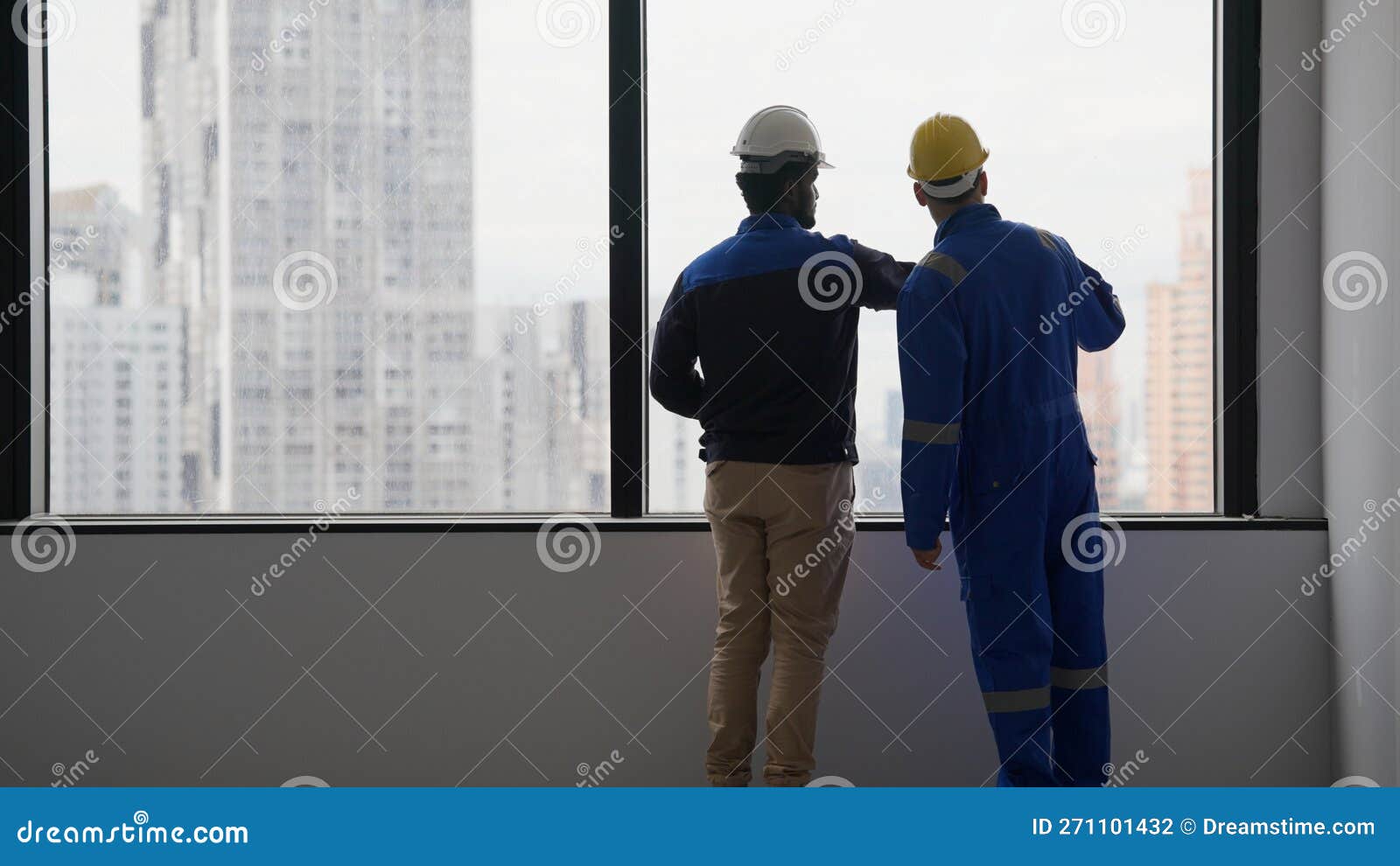 Professional Construction Workers Using Tablet Brainstorming and ...