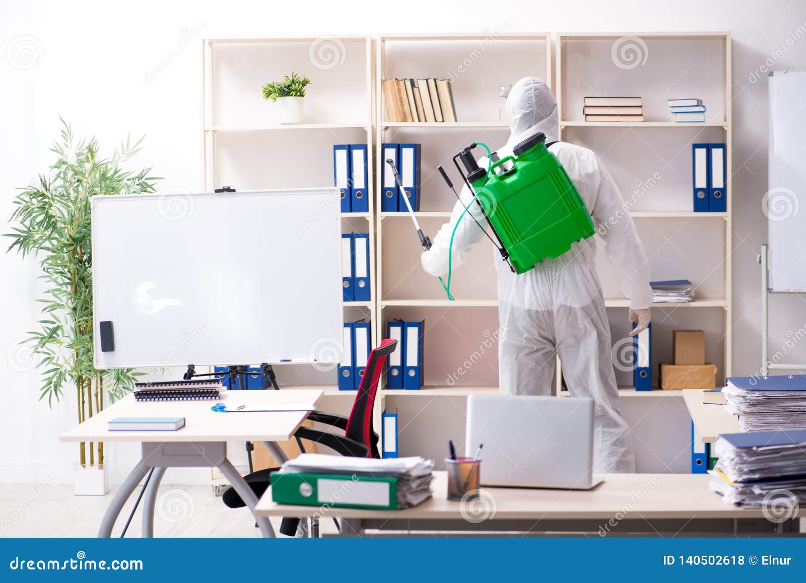 The Professional Contractor Doing Pest Control at Office Stock Photo ...