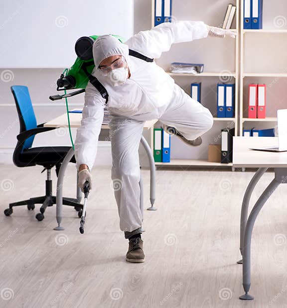 The Professional Contractor Doing Pest Control at Office Stock Image ...