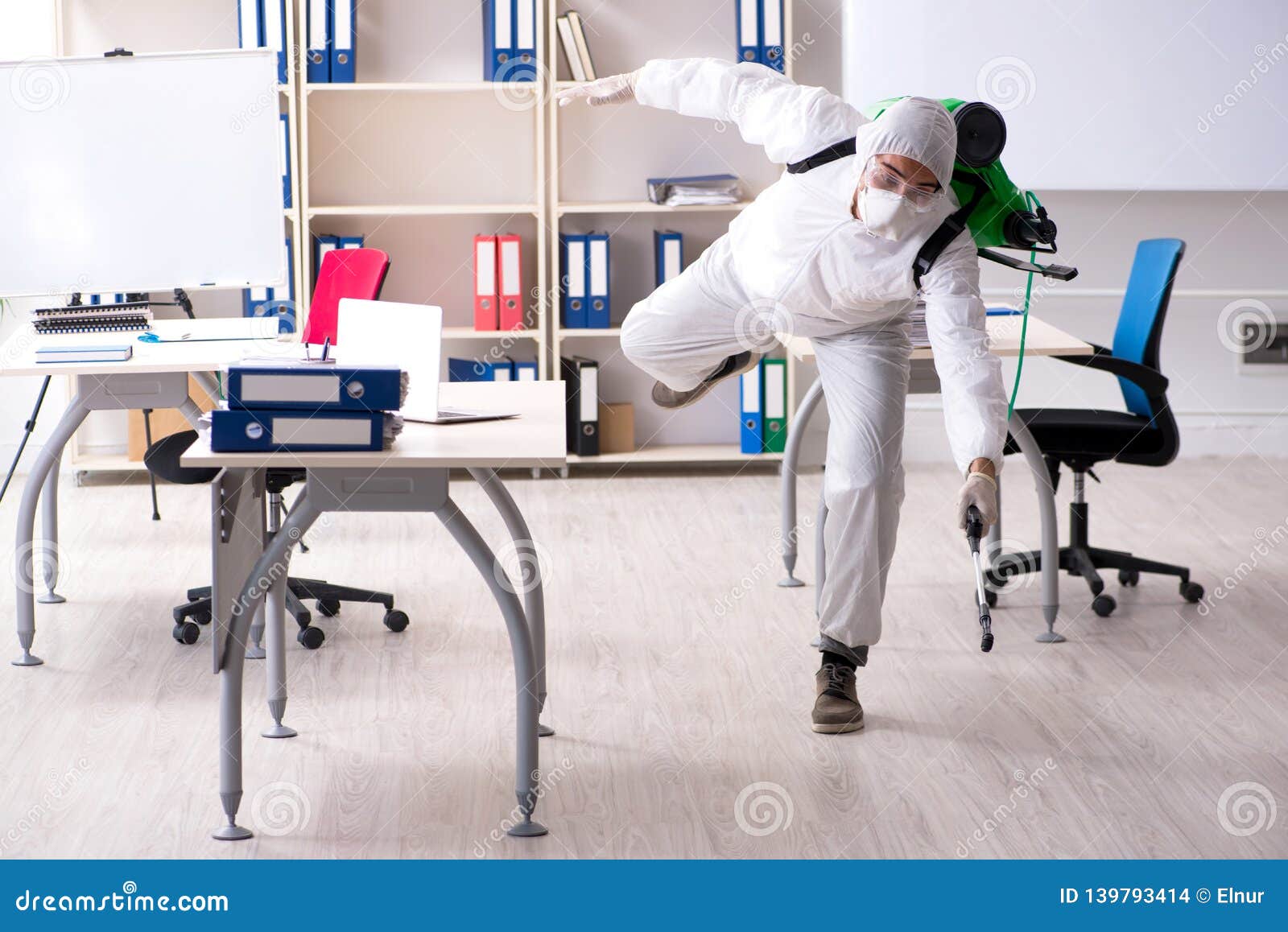 The Professional Contractor Doing Pest Control at Office Stock Photo ...