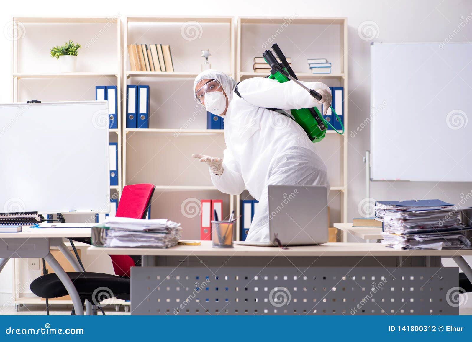 The Professional Contractor Doing Pest Control at Office Stock Photo ...