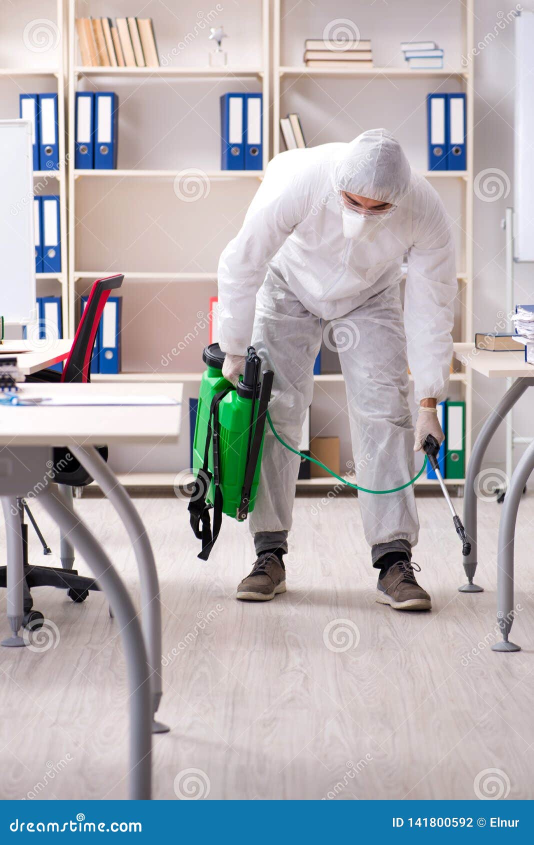 The Professional Contractor Doing Pest Control at Office Stock Photo ...