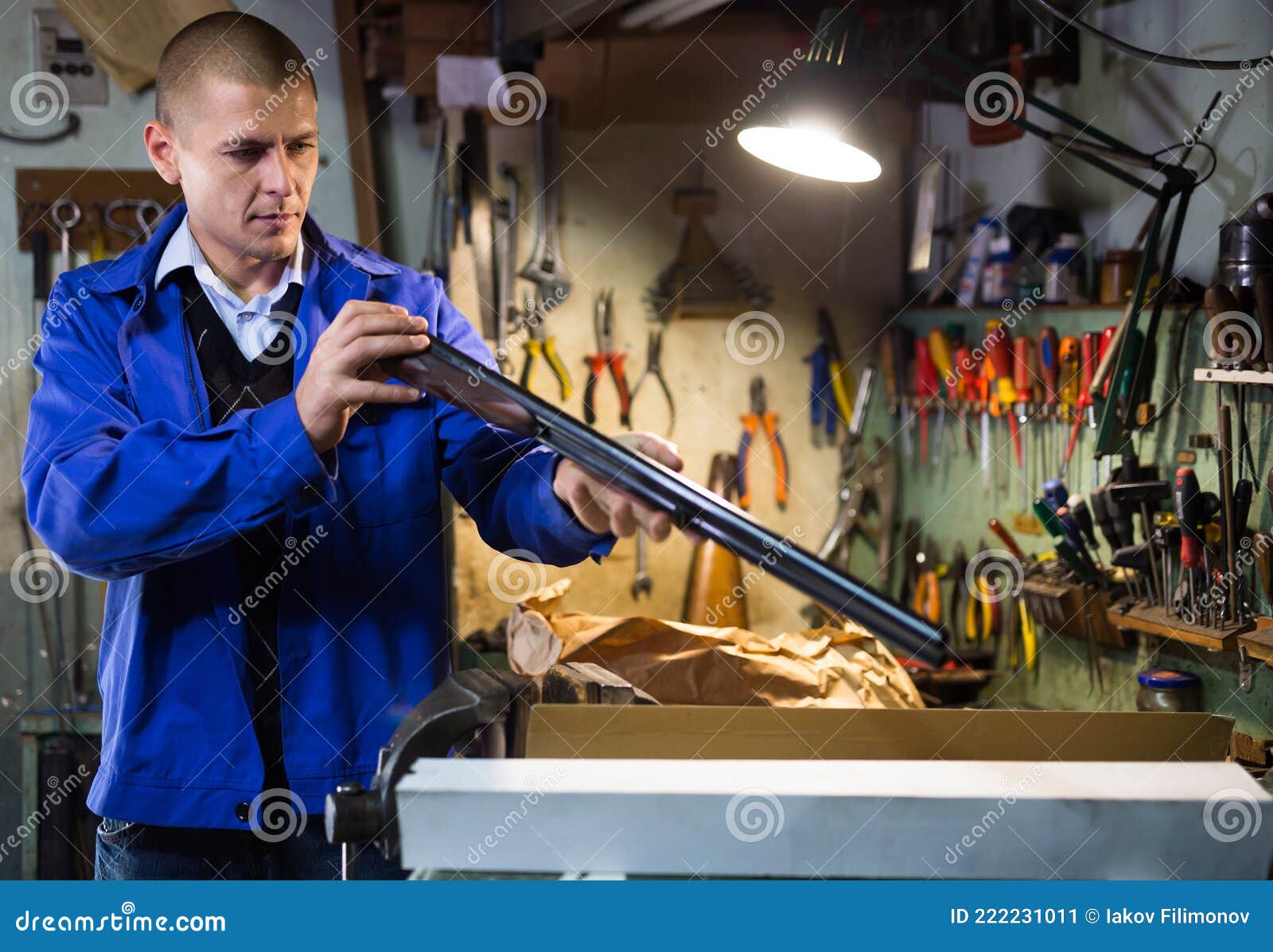 Professional Craftsman Repairing and Assembling Shotgun in Weapons ...