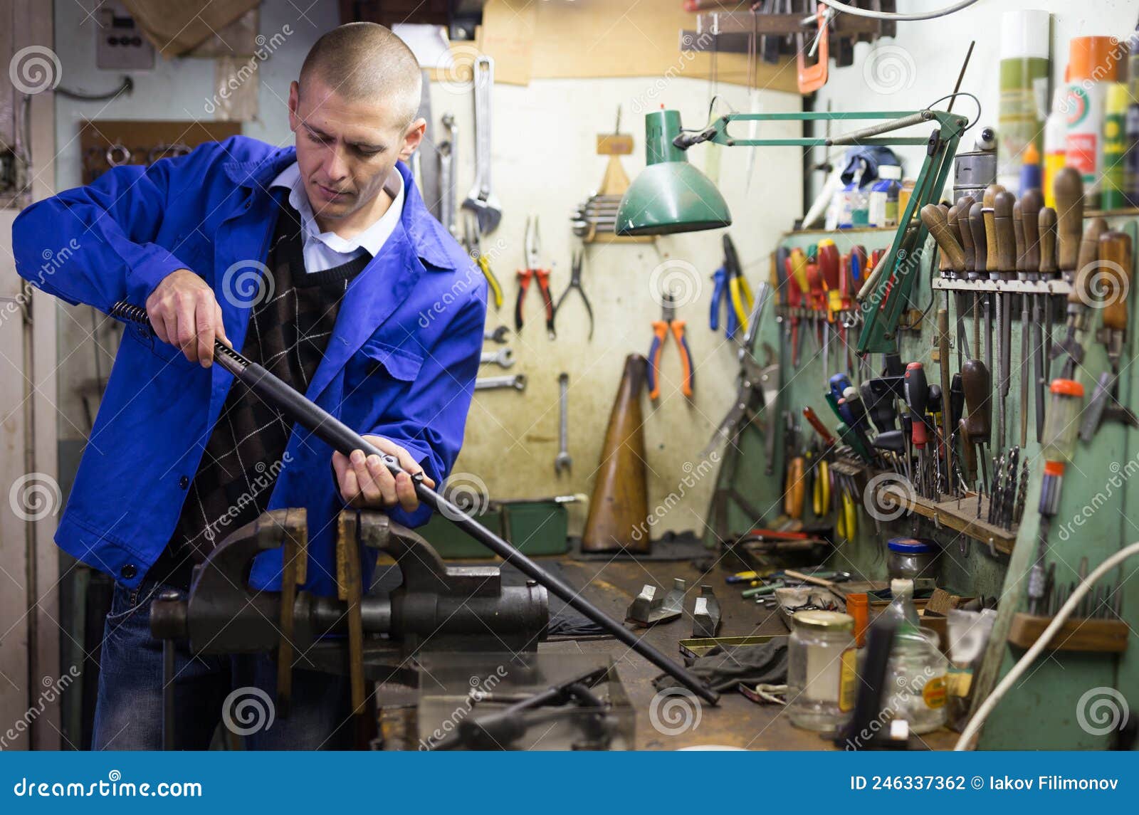 Professional Craftsman Repairing and Assembling Shotgun in Weapons ...