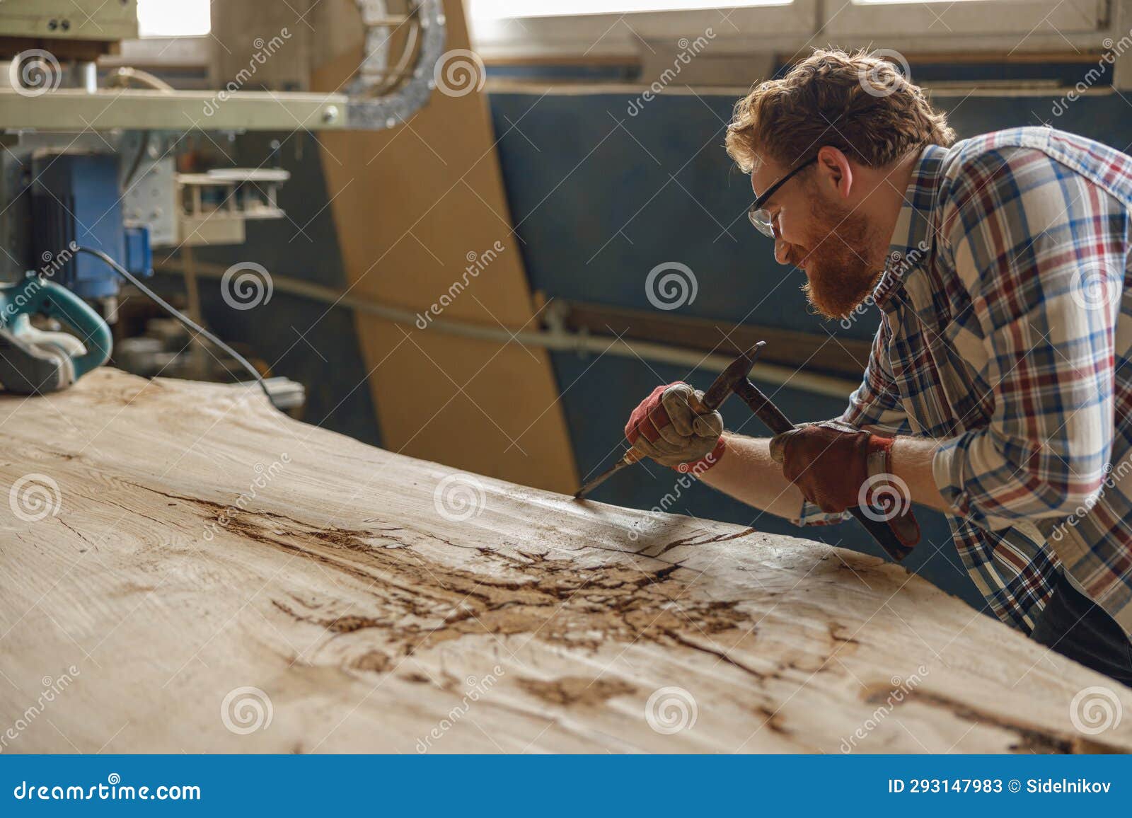 Professional Craftsman Working with Chisel while Cutting Wooden Plank ...