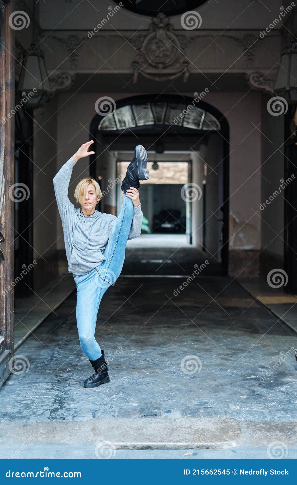 Professional Dancer Lifting Her Leg Up High. Urban Dance Stock Image ...