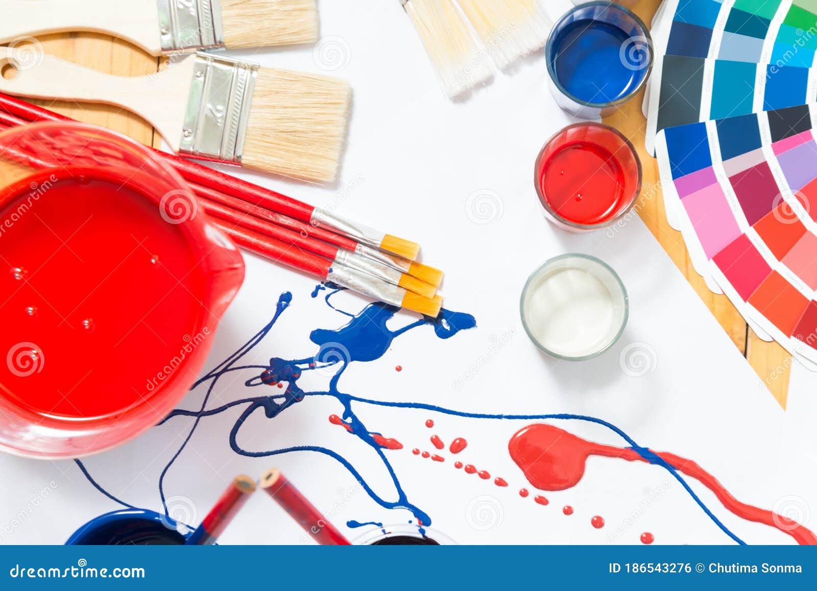Professional Decorator Drawing on a House Project with Work Tools Stock ...