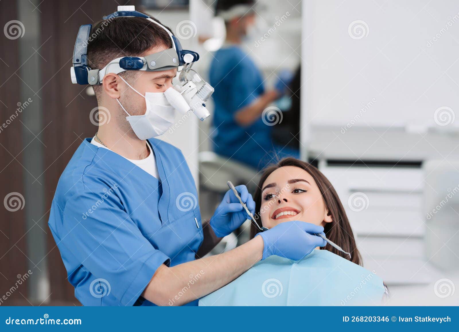 Professional Dentist Examination Patient with Microscope at the Office ...