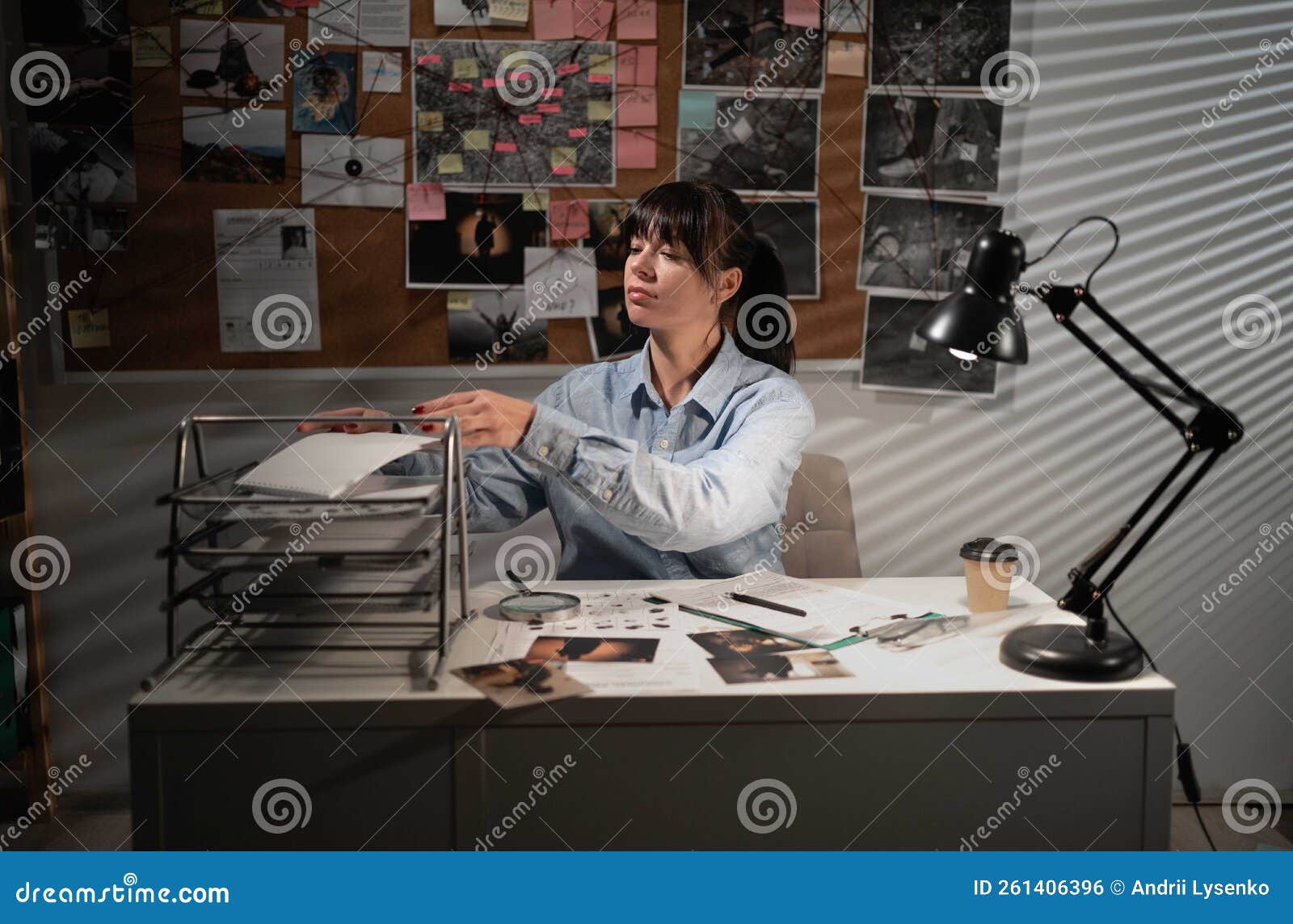 Professional Detective Working on Case in Office at Night. Stock Photo ...