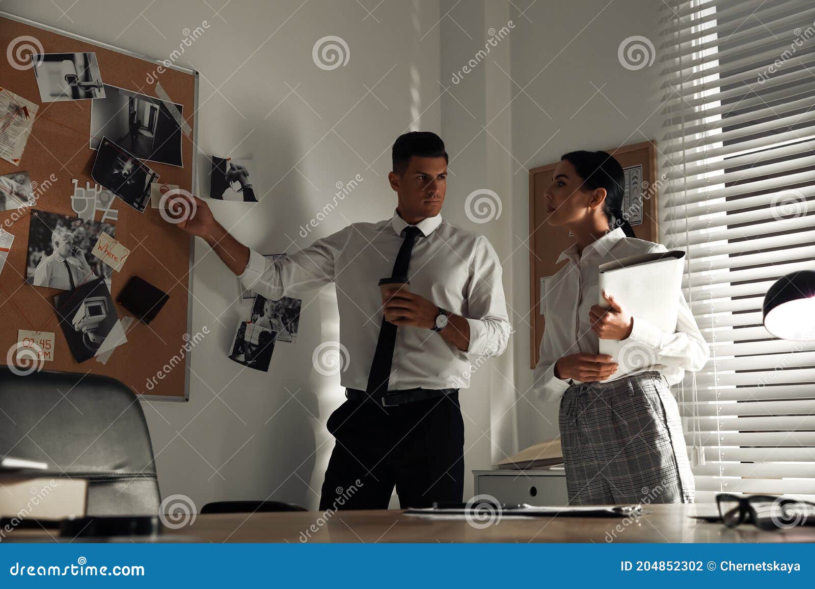 Professional Detectives Working At Desk In Office Stock Photo ...