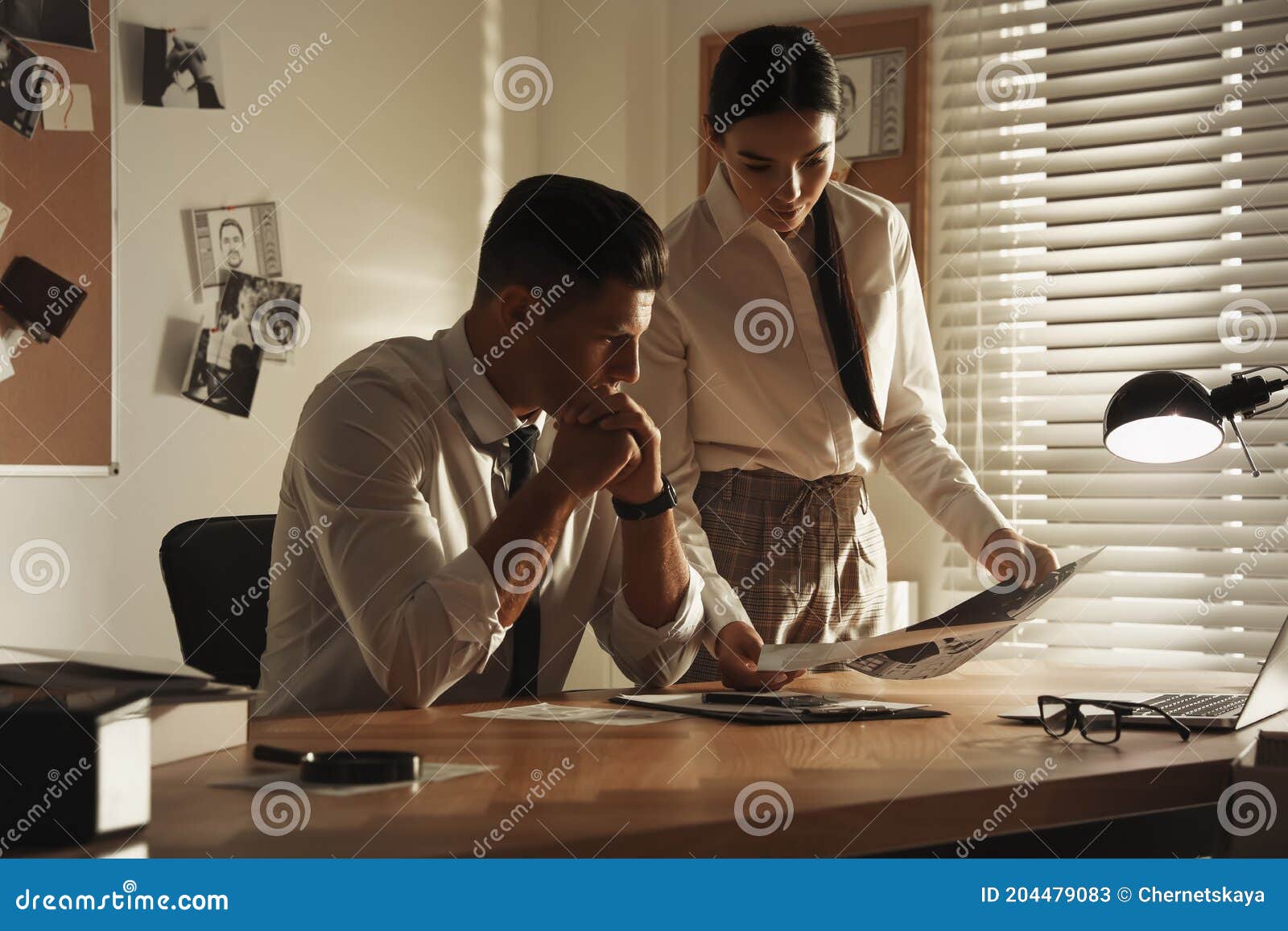 Professional Detectives Working At Desk In Office Stock Photo ...