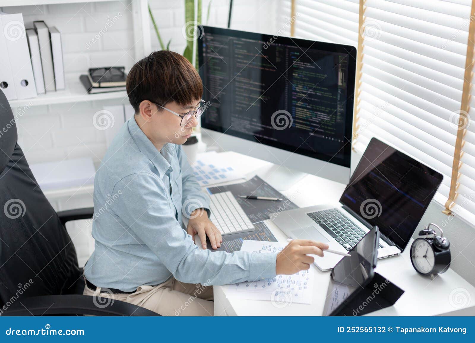 Professional Development Programmers are Using Tablet To Test the ...