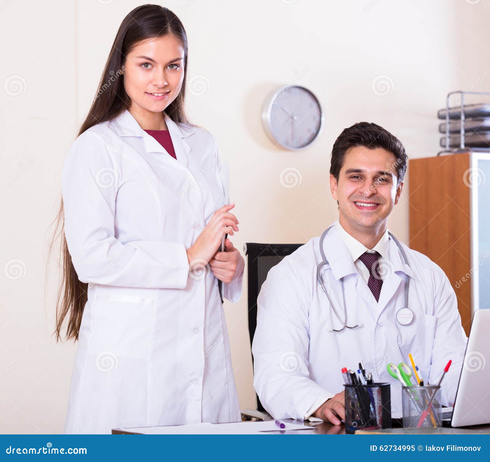 Professional Doctors Smiling in Clinic Stock Image - Image of doctors ...