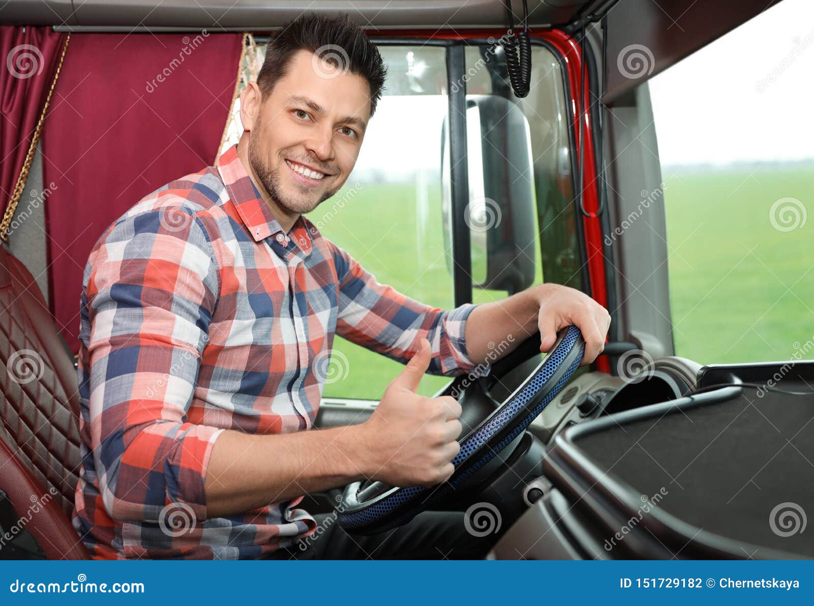 Professional Driver Sitting in Cab of Truck Stock Photo - Image of ...