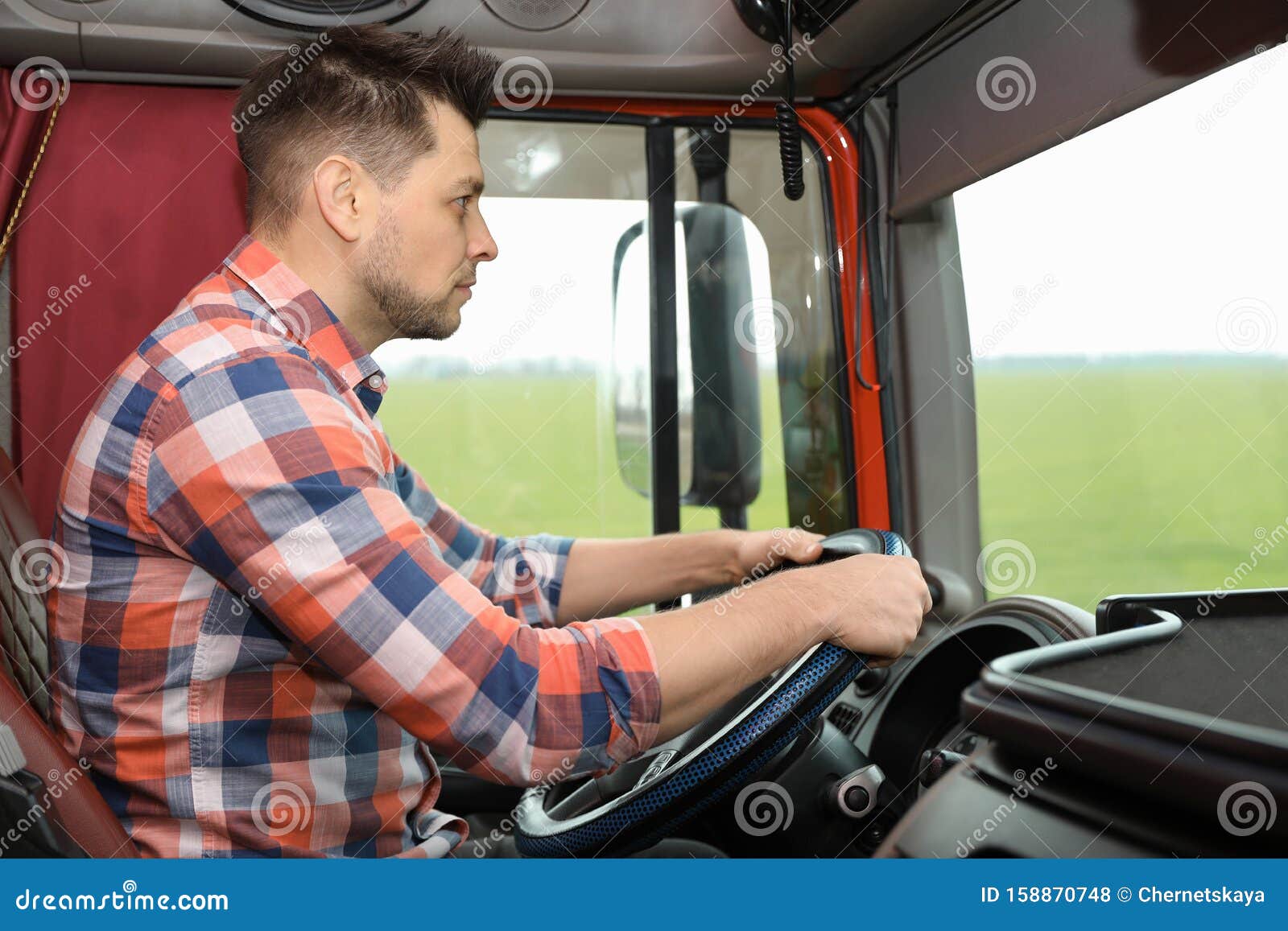 Professional Driver Sitting in Cab of Truck Stock Photo - Image of ...