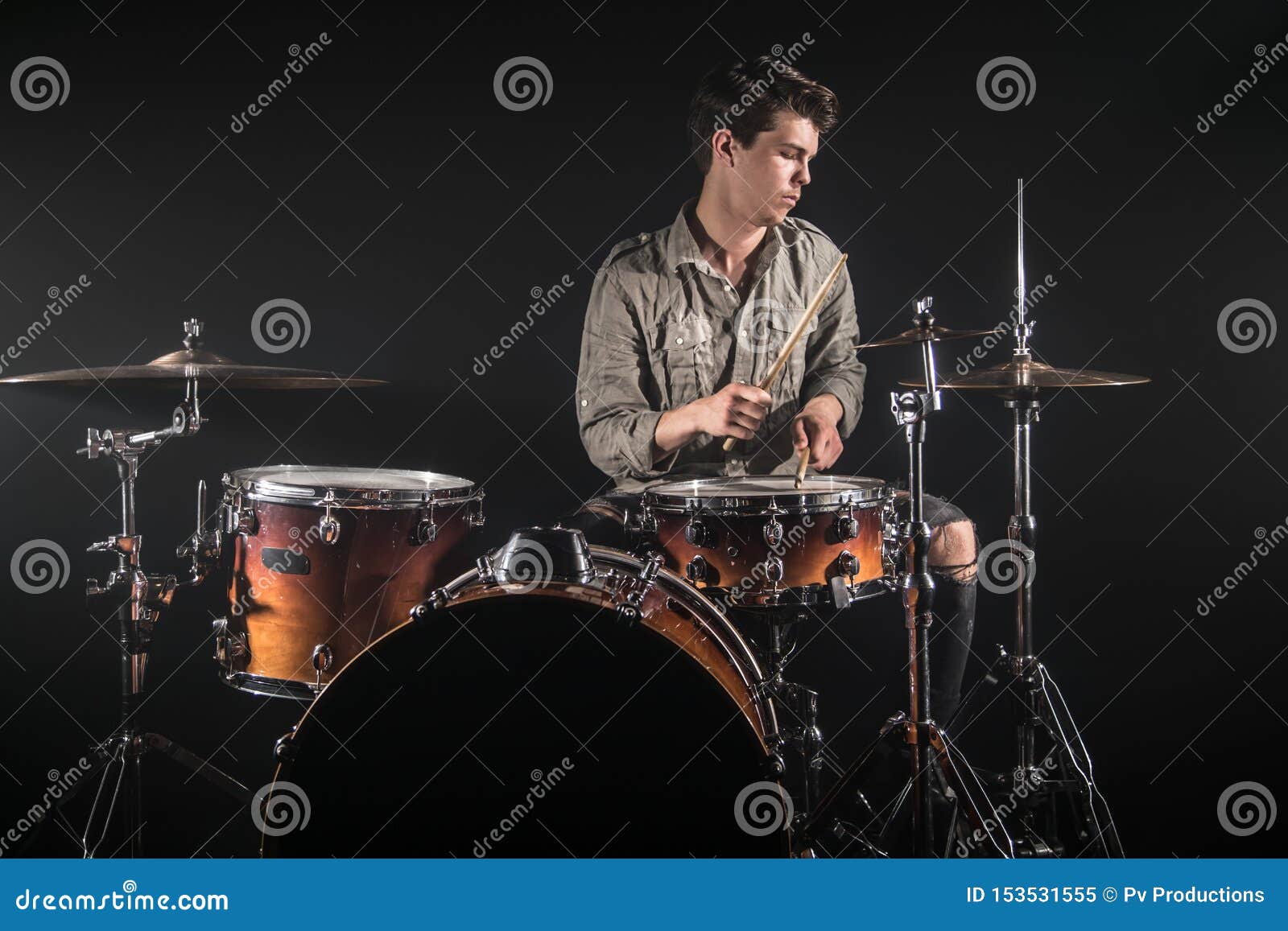 Professional Drummer Playing on Drum Set on Stage on the Black ...