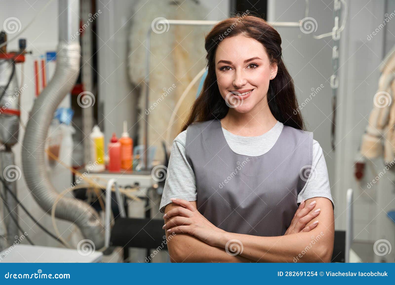 Professional Dry Cleaning Service Operator Looking at Camera at ...