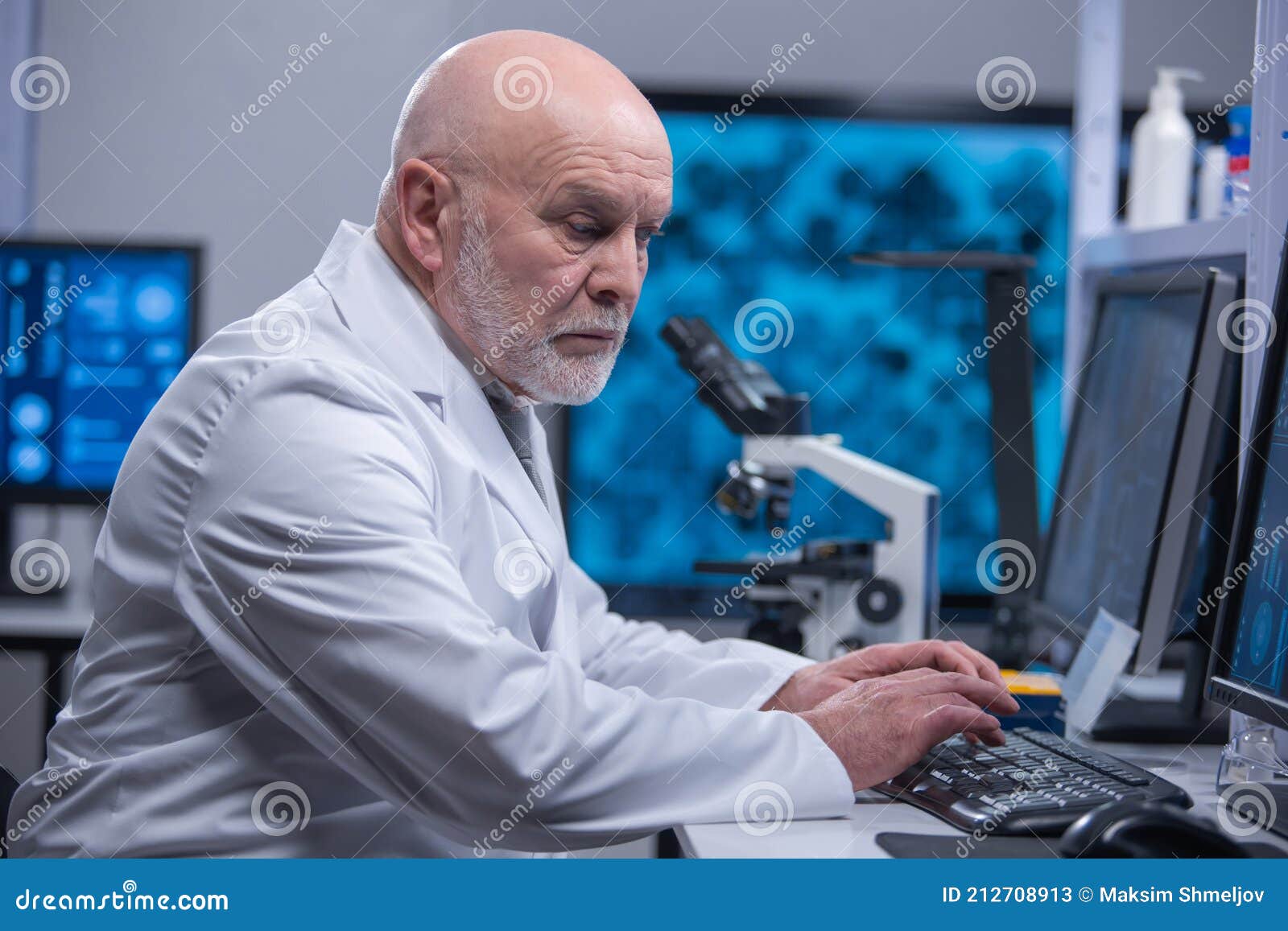 Elderly Professor is Doing a Science Experiment in a Modern Laboratory ...