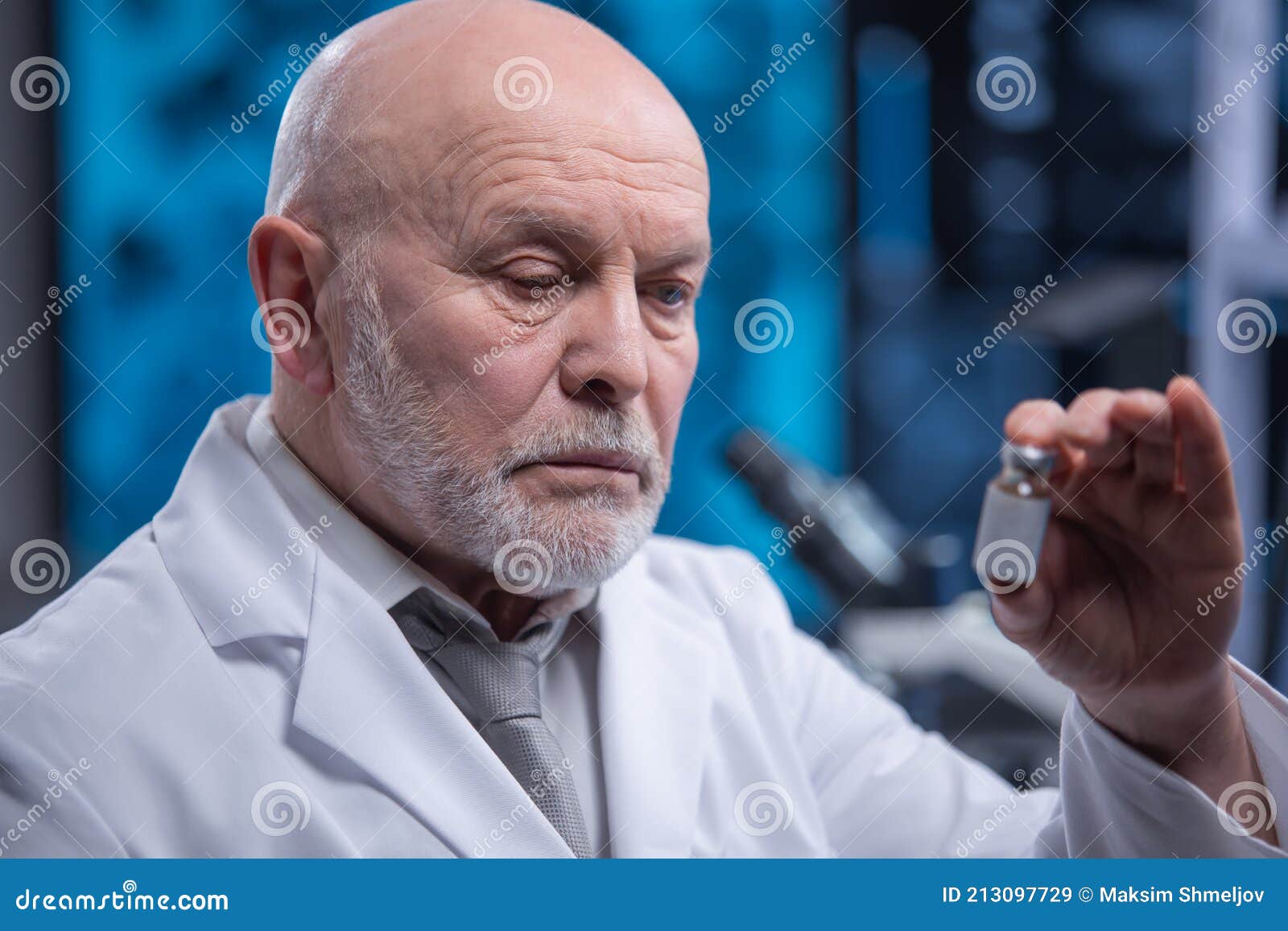Elderly Professor is Doing a Science Experiment in a Modern Laboratory ...