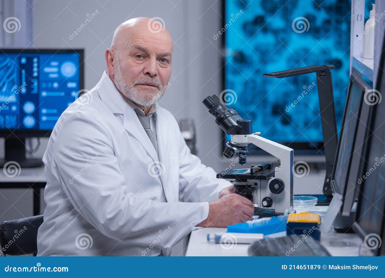 Elderly Professor is Doing a Science Experiment in a Modern Laboratory ...