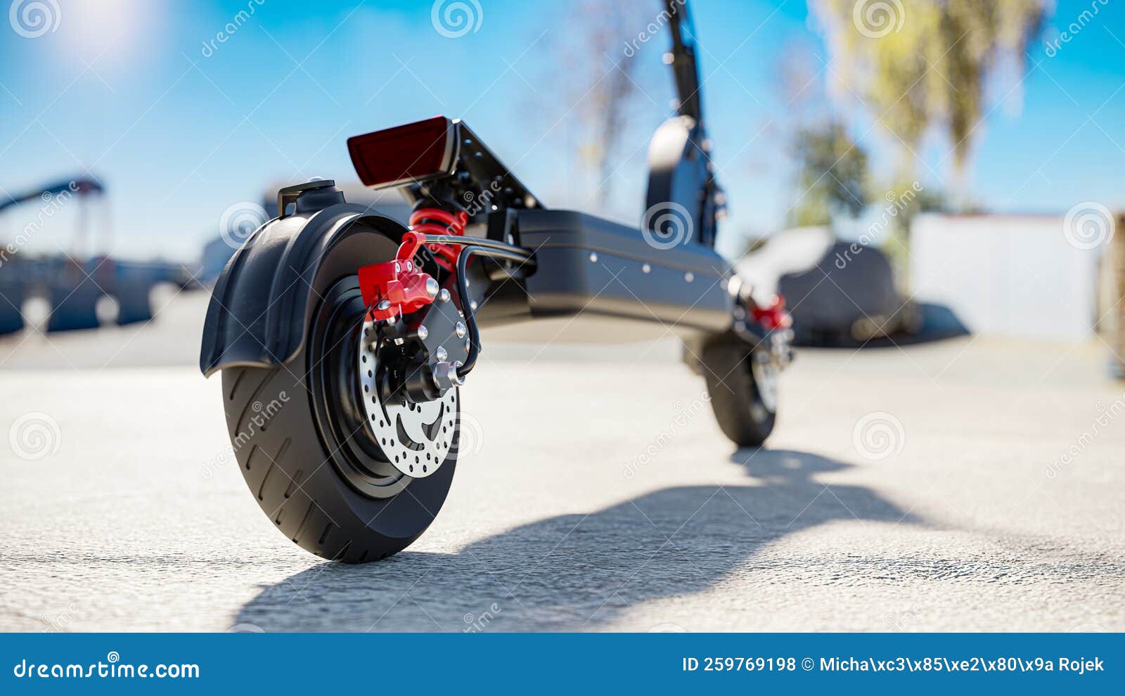 Professional Electric Scooter with Suspension System - Standing in an ...