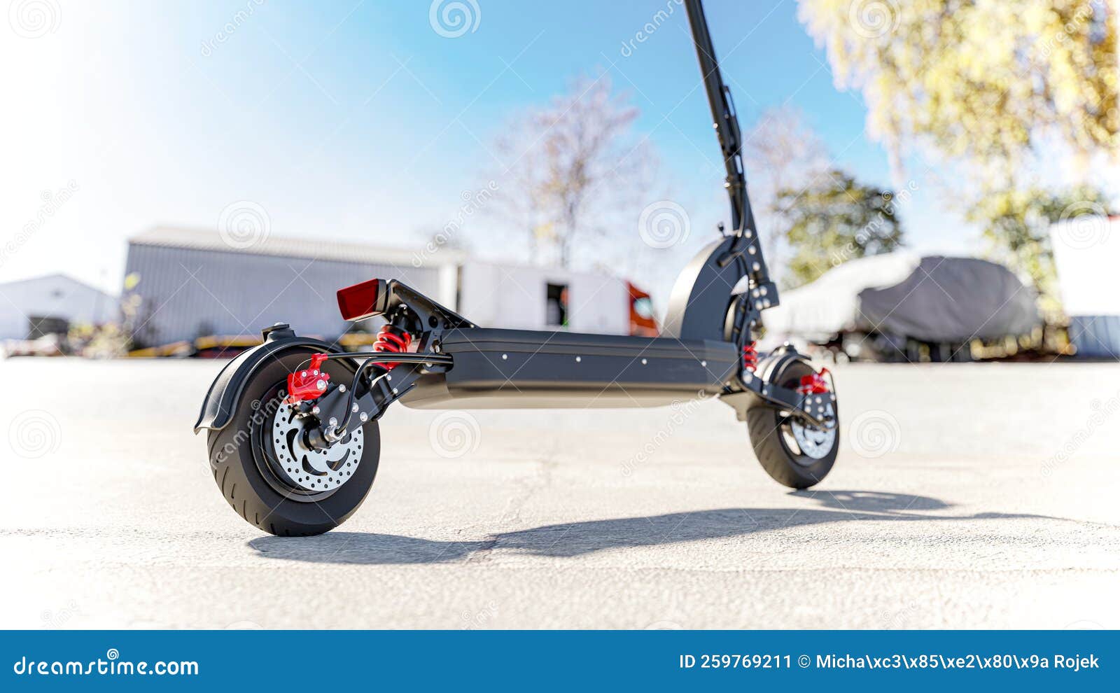 Professional Electric Scooter with Suspension System - Standing in an ...