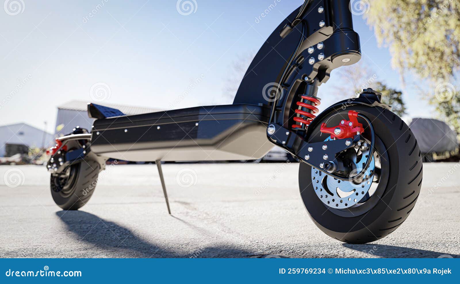 Professional Electric Scooter with Suspension System - Standing in an ...