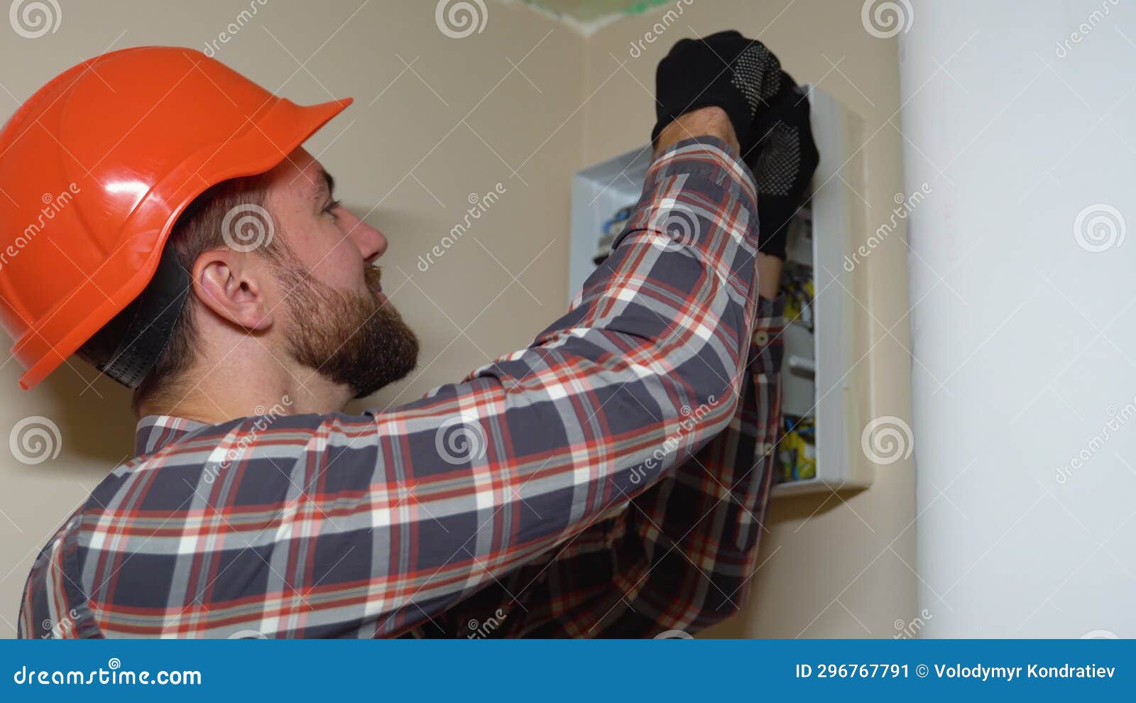 Professional Electrician Installing Electrical Panel. Electric Shock ...