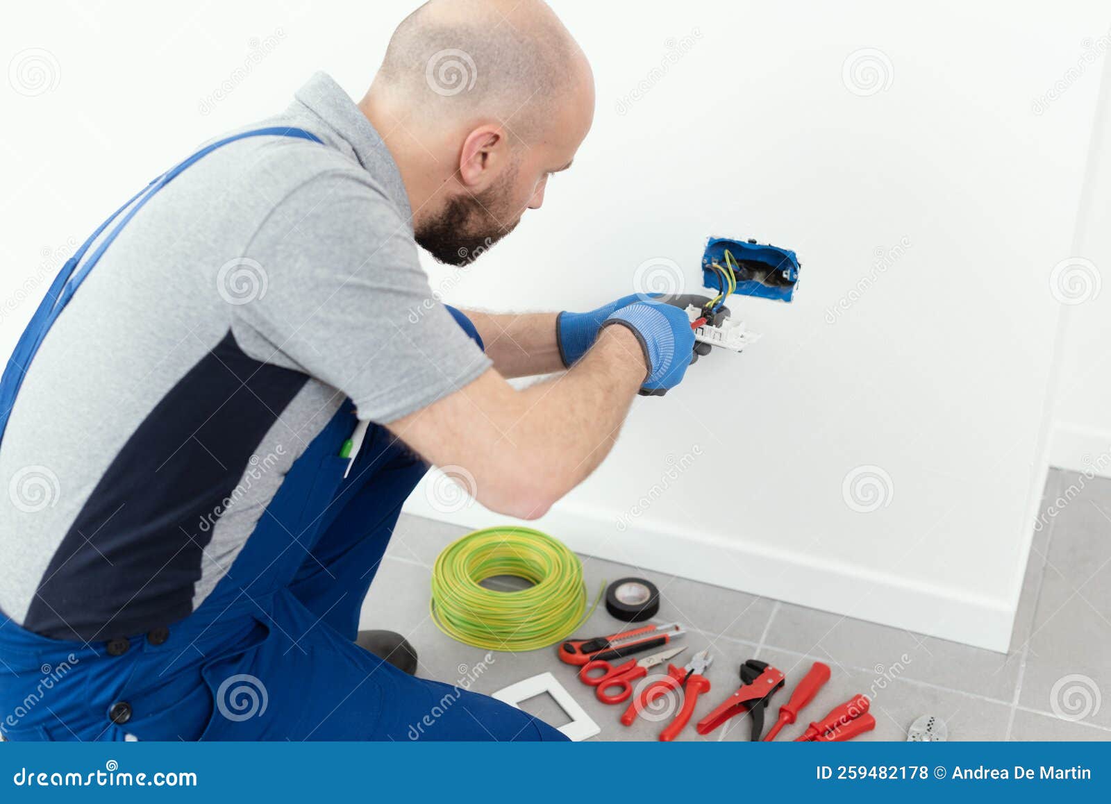 Professional Electrician Installing a Wall Socket Stock Photo - Image ...