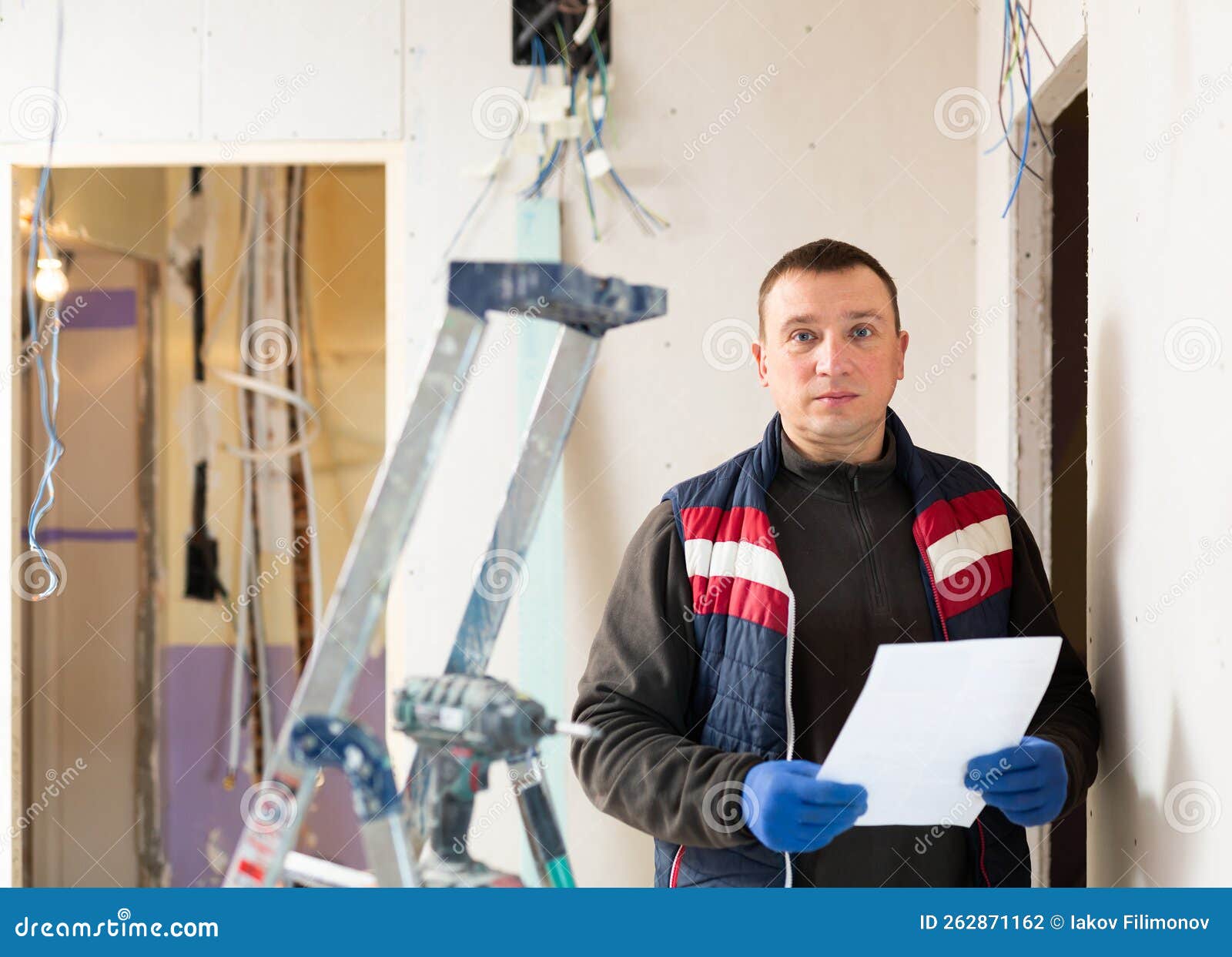 Professional Electrician Reads Electrical Wiring Plan Stock Photo ...