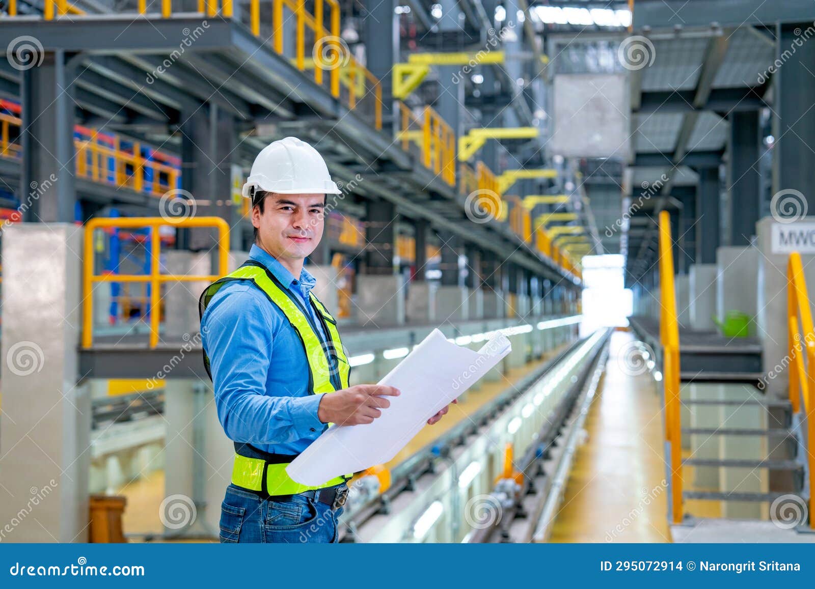 Professional Engineer Hold Construction Chart or Plan and Look at ...