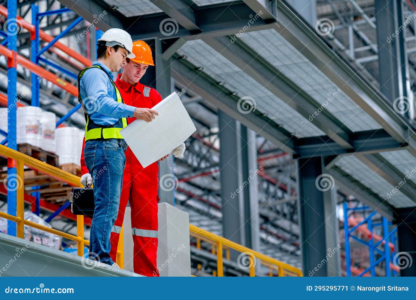 Professional Engineer Hold Drawing Plan and Technician Worker Stay and ...