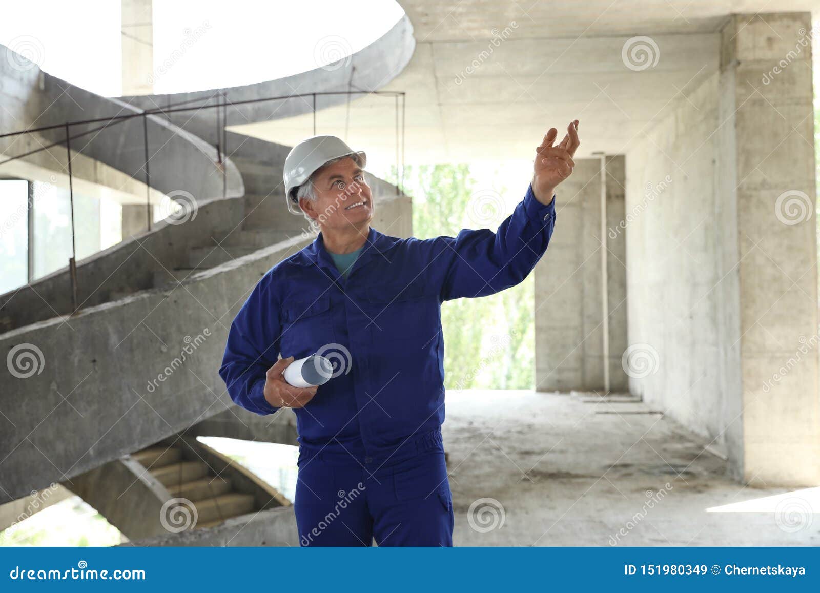 Professional Engineer In Safety Equipment With Drafting At Construction ...