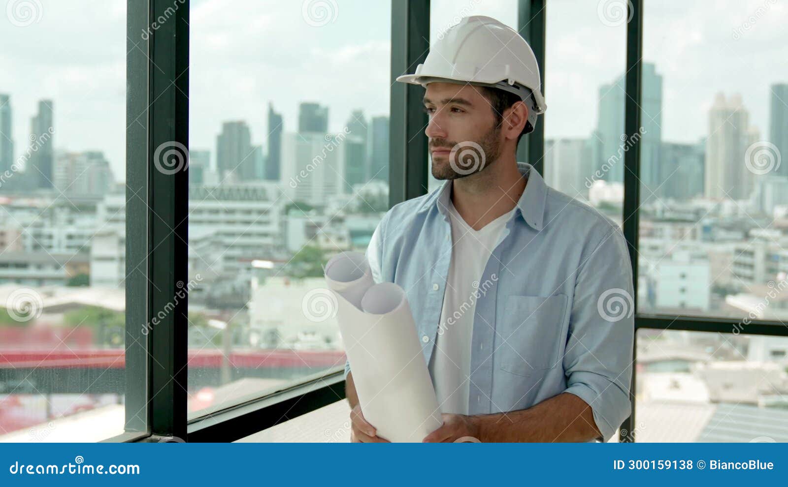 Professional Engineer Smiling while Looking at Skyscraper View. Tracery ...