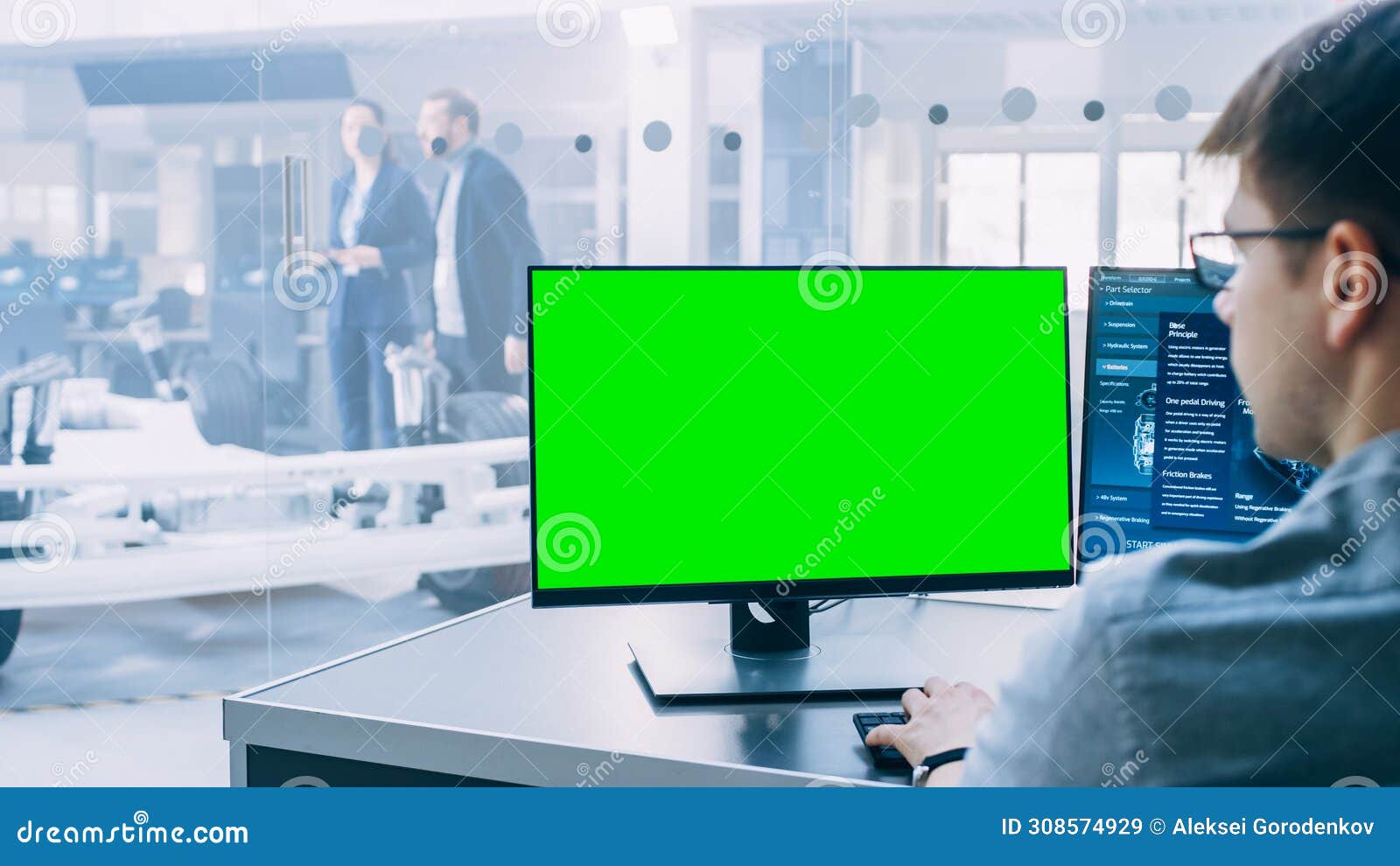 Professional Engineer Works on a Computer with Green Screen Mock-up ...