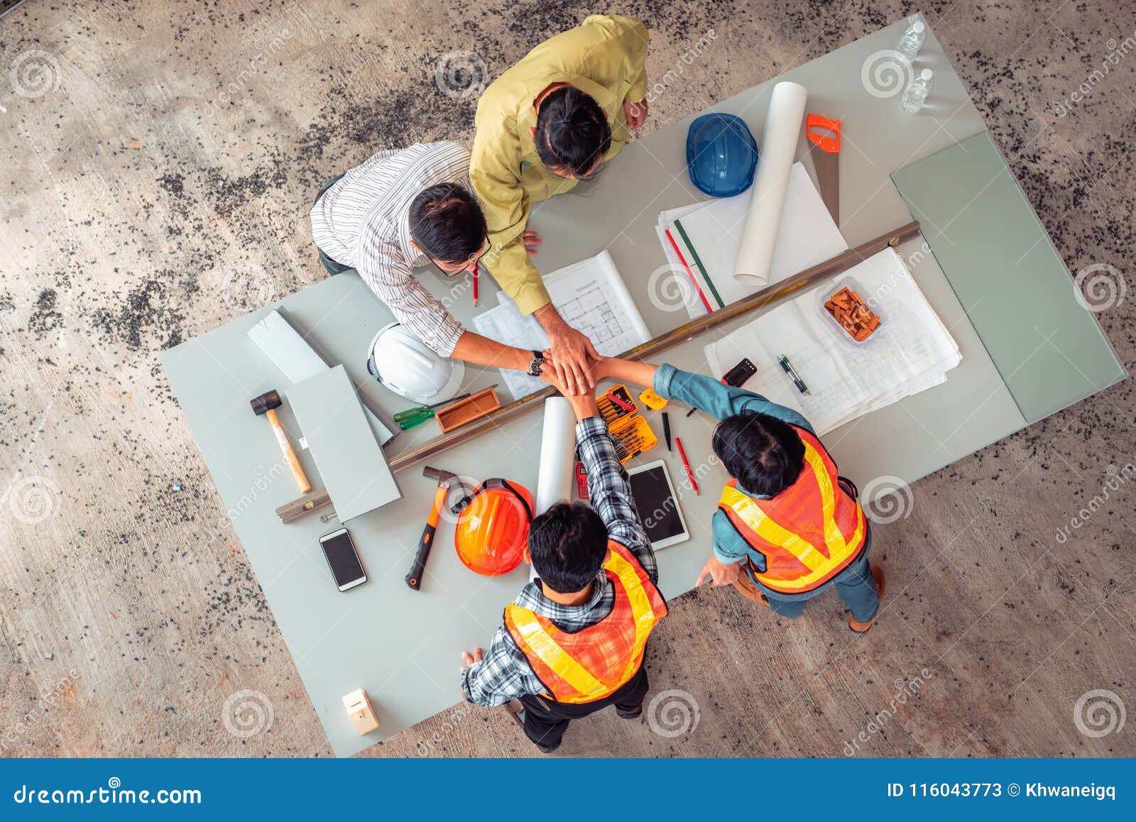 Professional Engineering Team Shaking Hands Together for Unity T Stock ...