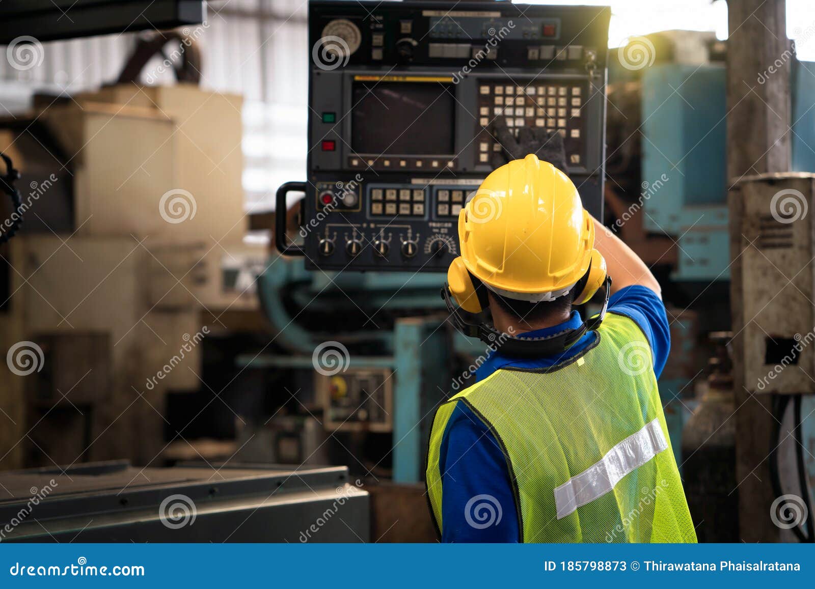 Professional Engineers in Factory. Technicians are Showing Machine ...