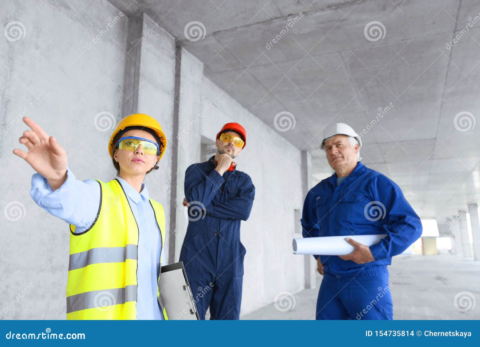 Professional Engineers in Safety Equipment Stock Photo - Image of adult ...