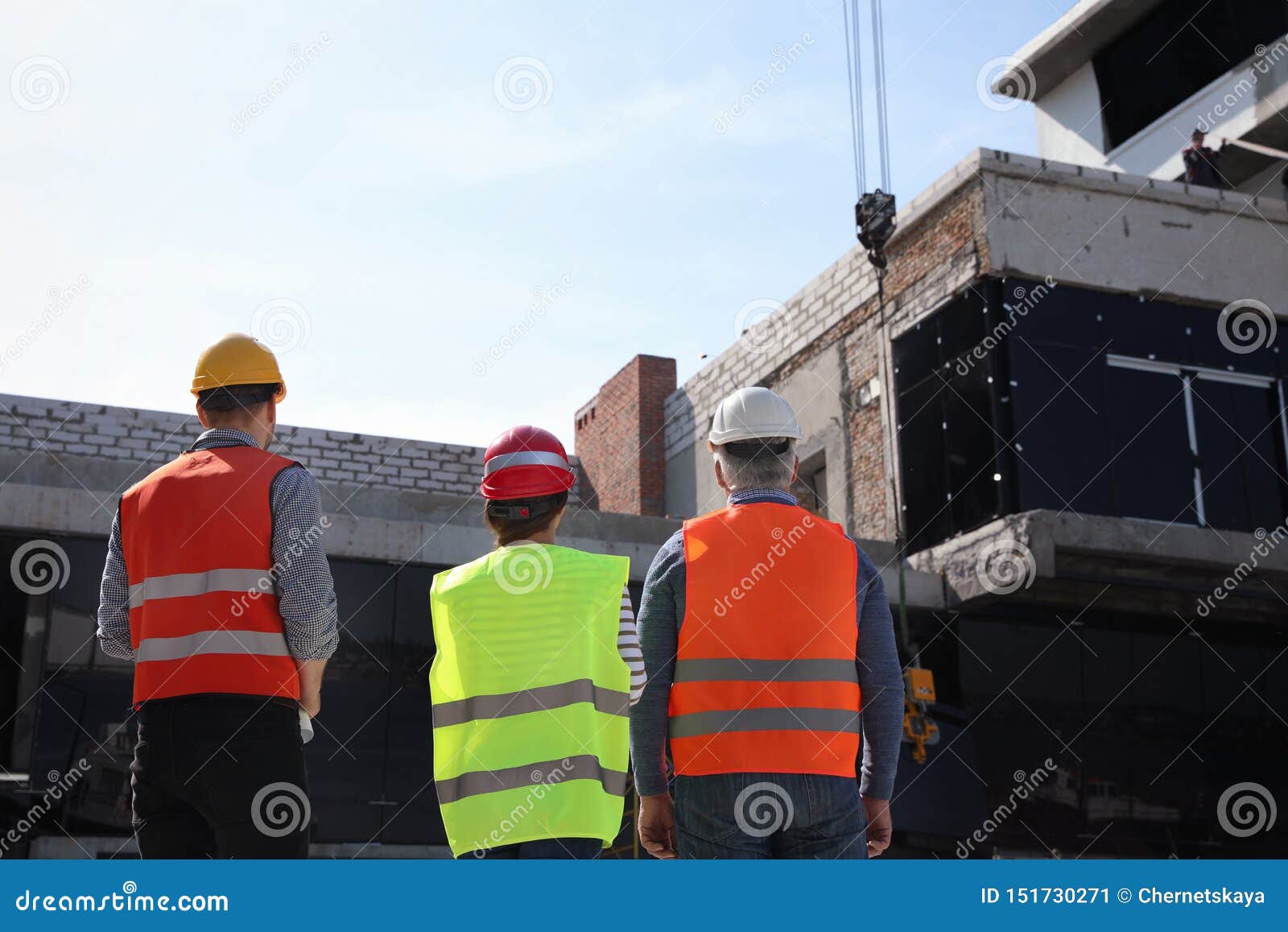 Professional Engineers in Safety Equipment at Construction Site Stock ...