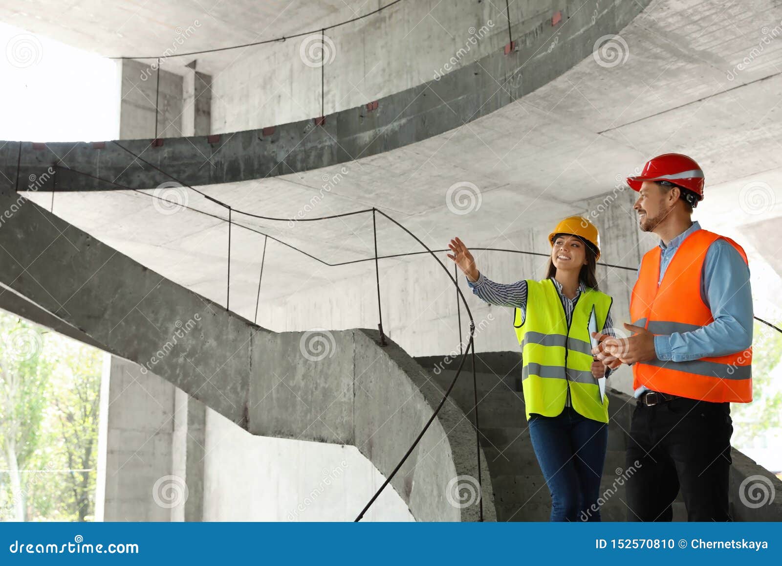 Professional Engineers in Safety Equipment at Construction Site Stock ...