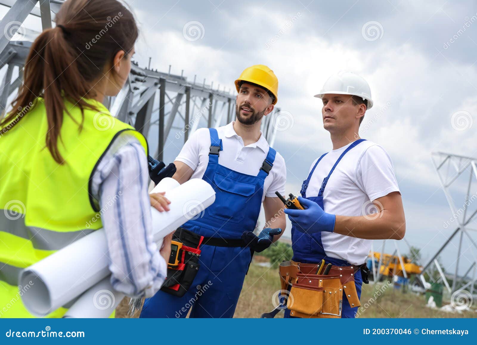 Professional Engineers Working on Installation of Electrical Substation ...
