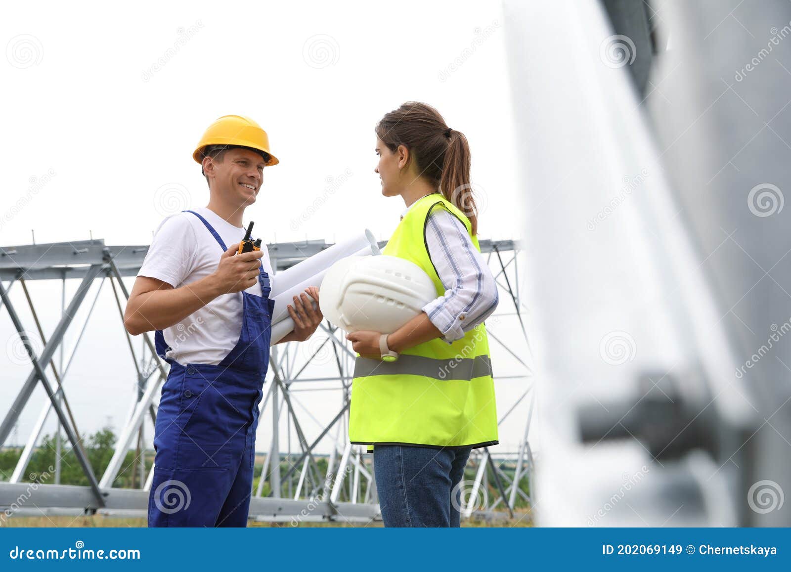 Professional Engineers Working on Installation of Electrical Substation ...