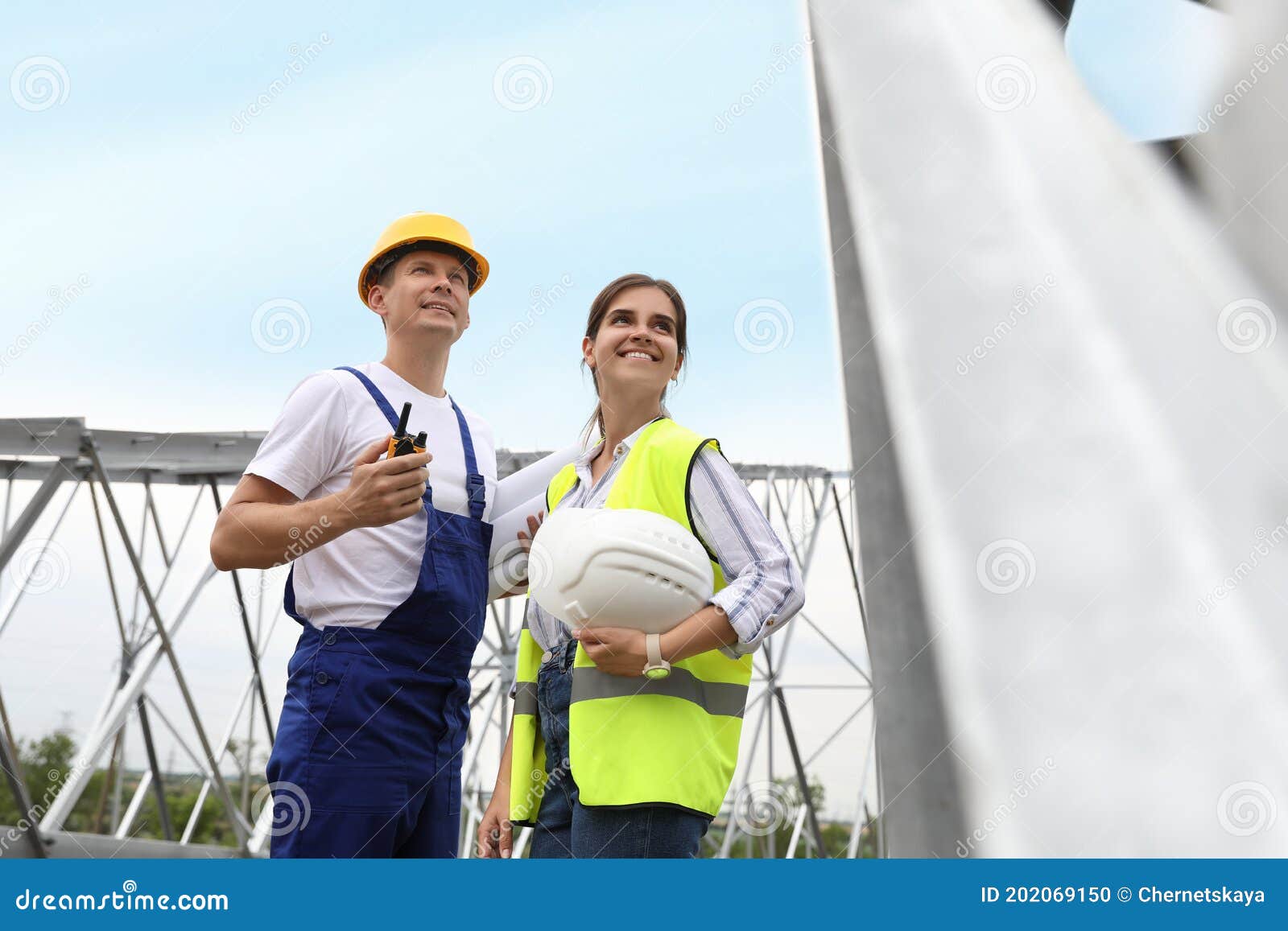 Professional Engineers Working on Installation of Electrical Substation ...