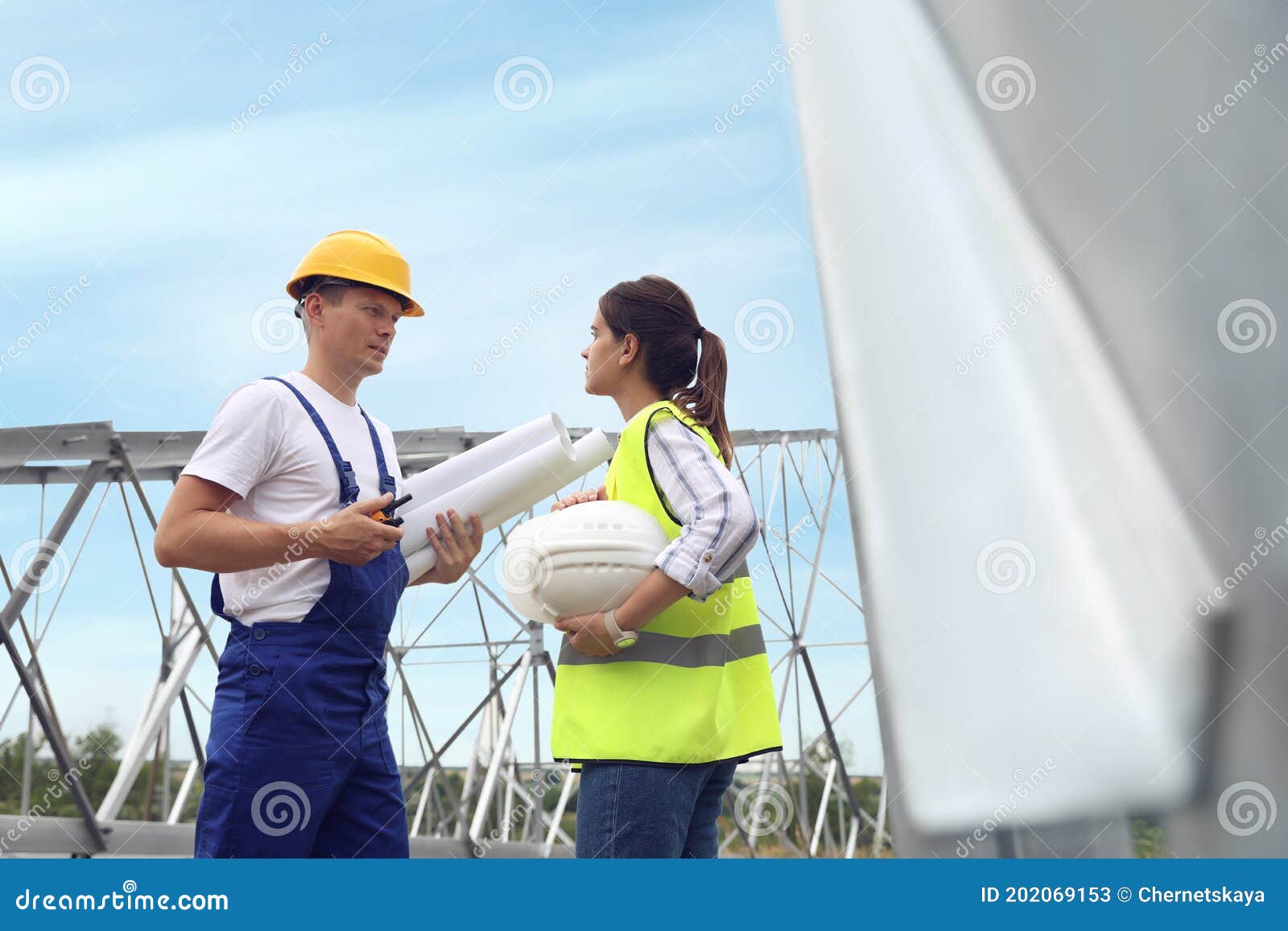 Professional Engineers Working on Installation of Electrical Substation ...