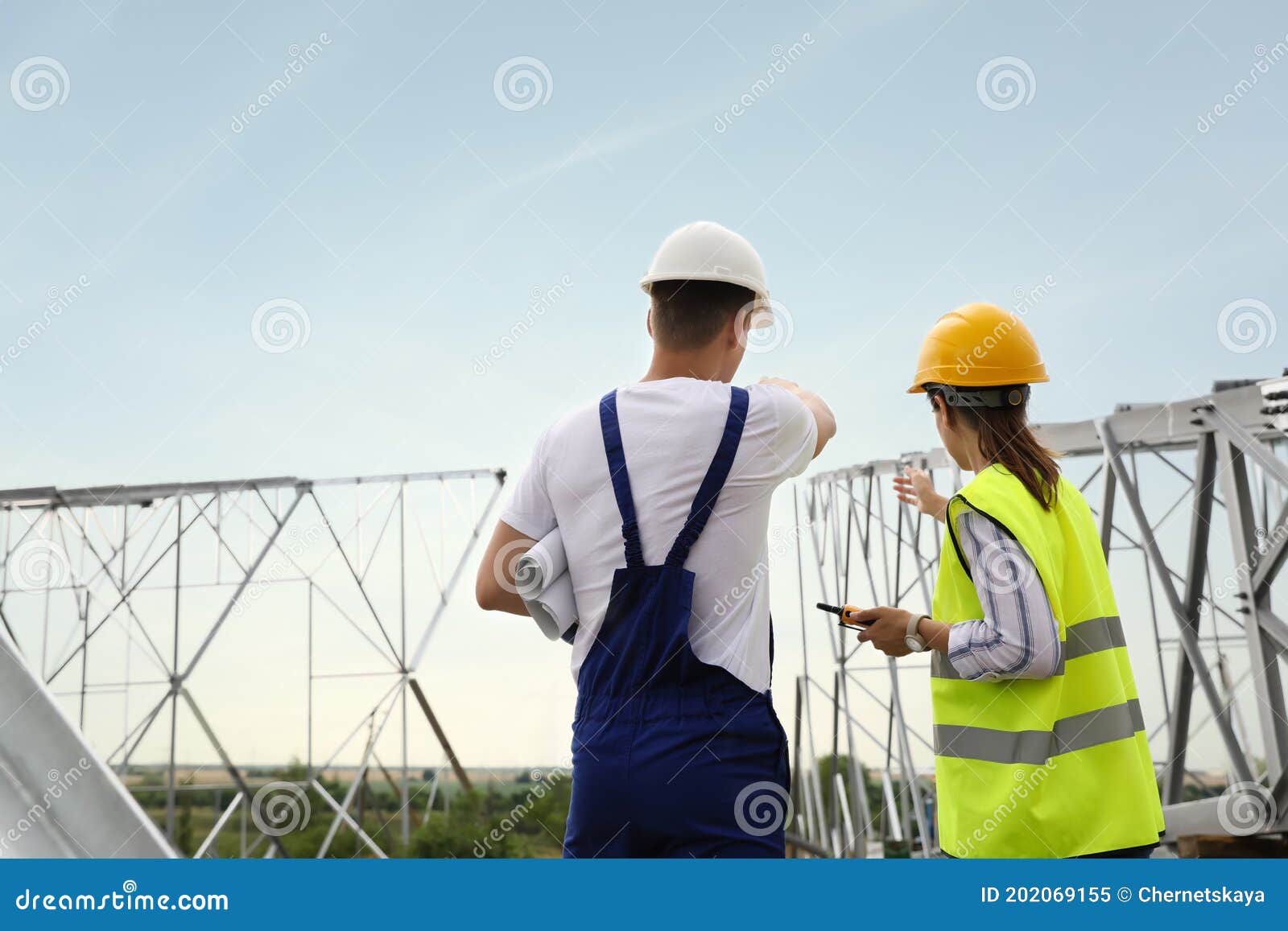 Professional Engineers Working on Installation of Electrical Substation ...