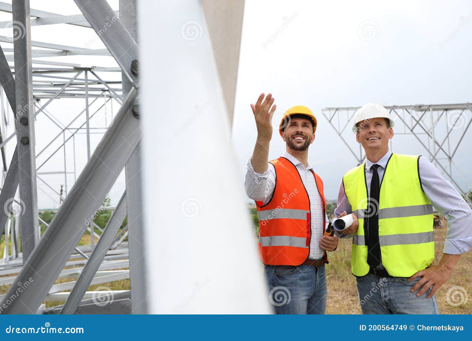 Professional Engineers Working on Installation of Electrical Substation ...