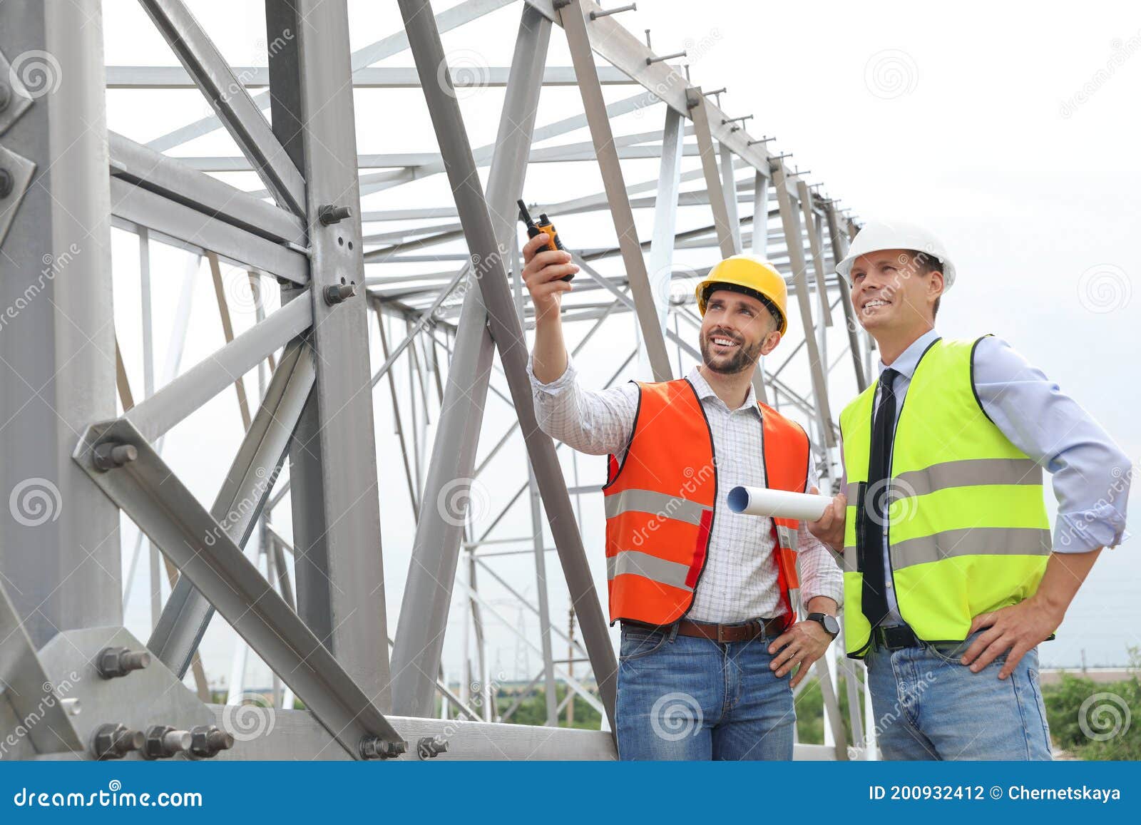 Professional Engineers Working on Installation of Electrical Substation ...