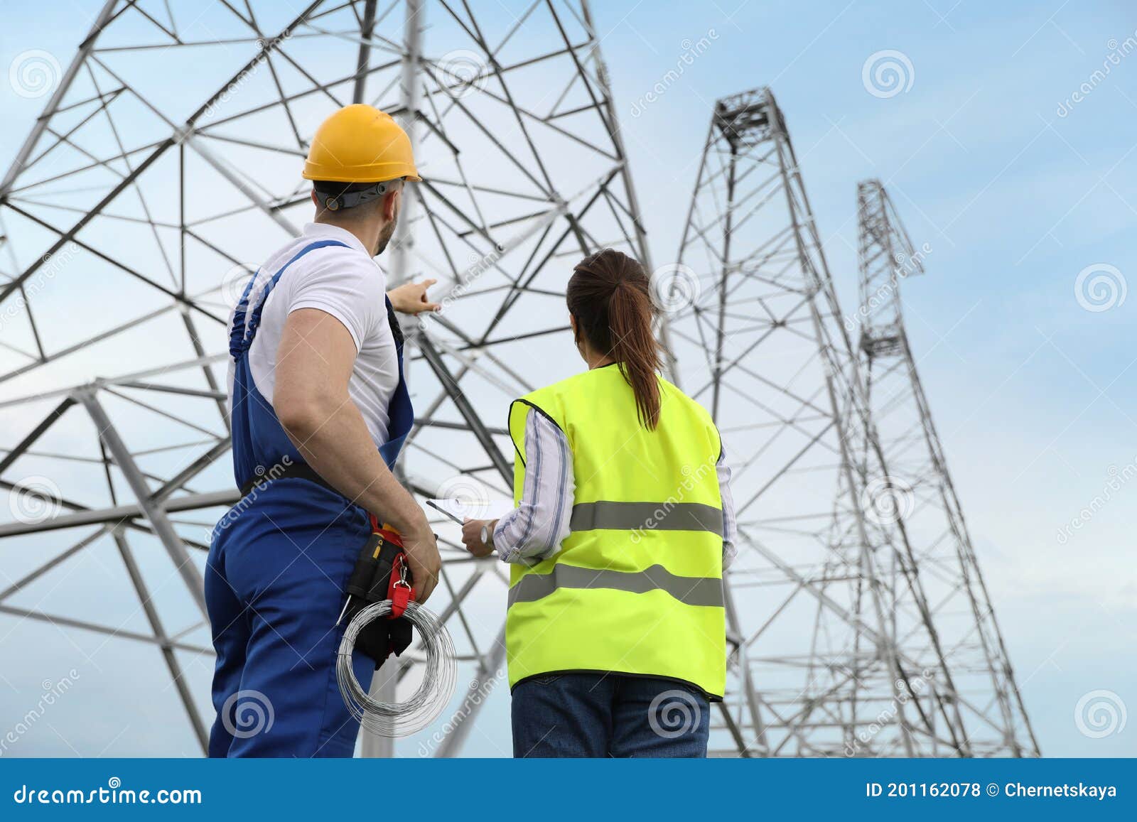 Professional Engineers Working on Installation of Electrical Substation ...